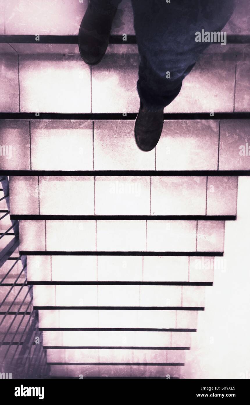 Feet walking down stairs hi-res stock photography and images - Alamy