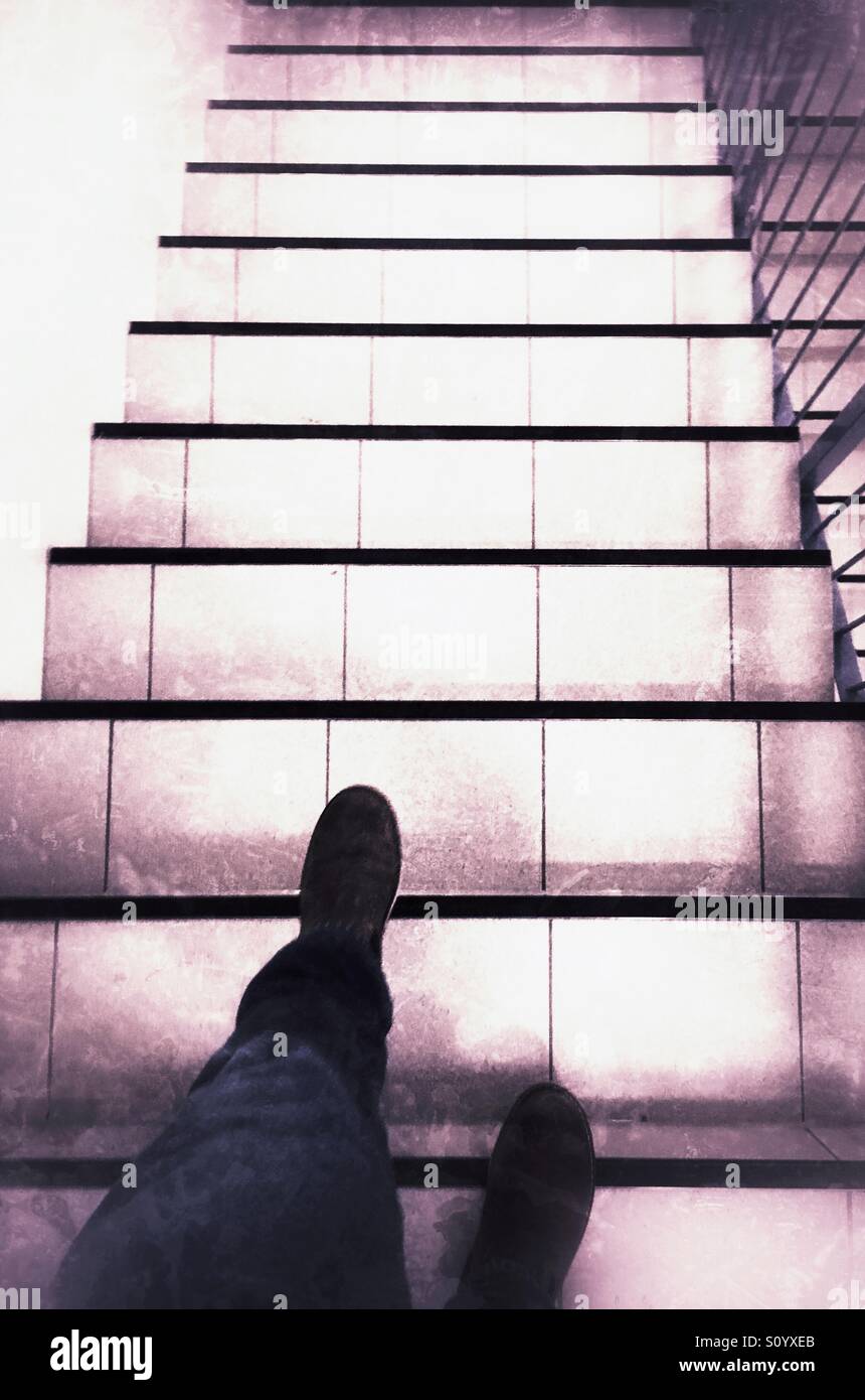 Legs walking down stairs hi-res stock photography and images - Alamy