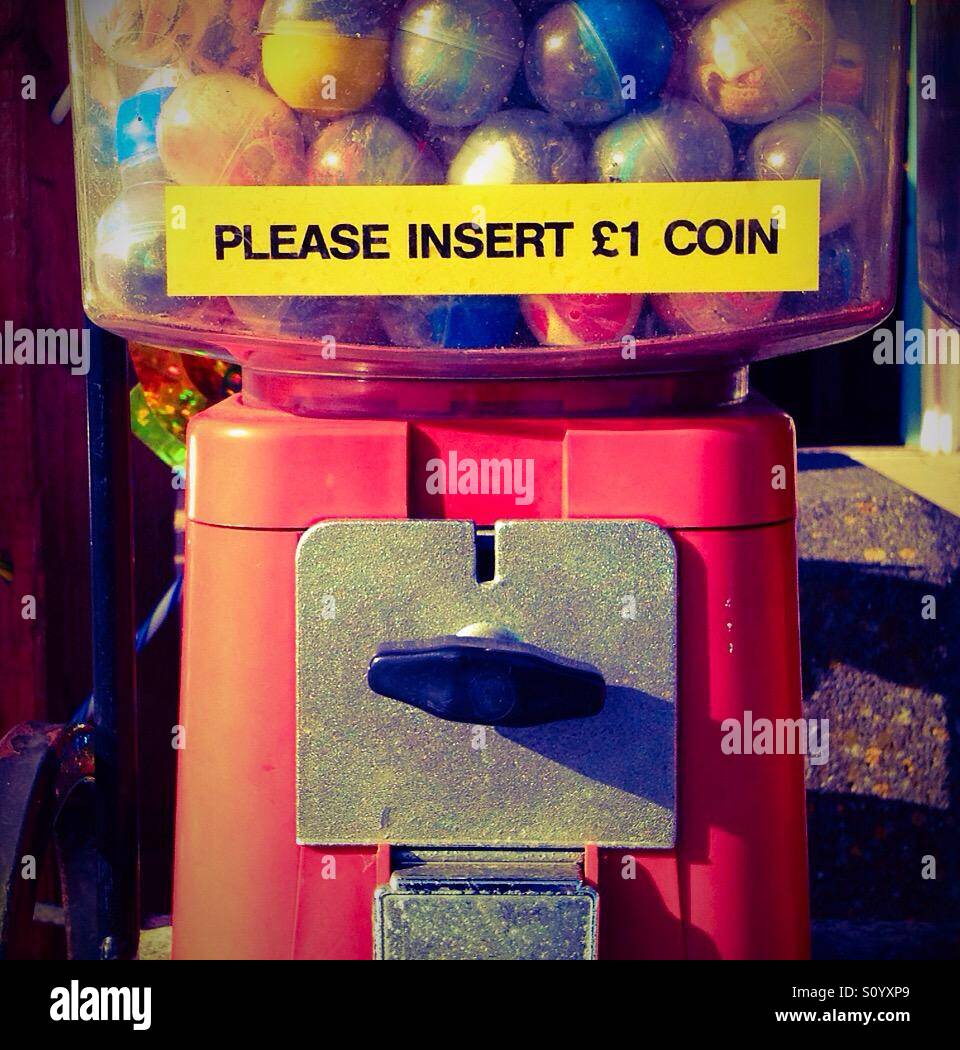 Coin slit machine hi-res stock photography and images - Alamy