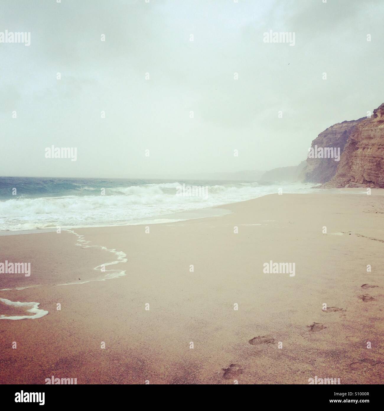 Beach in the rain hi-res stock photography and images - Alamy