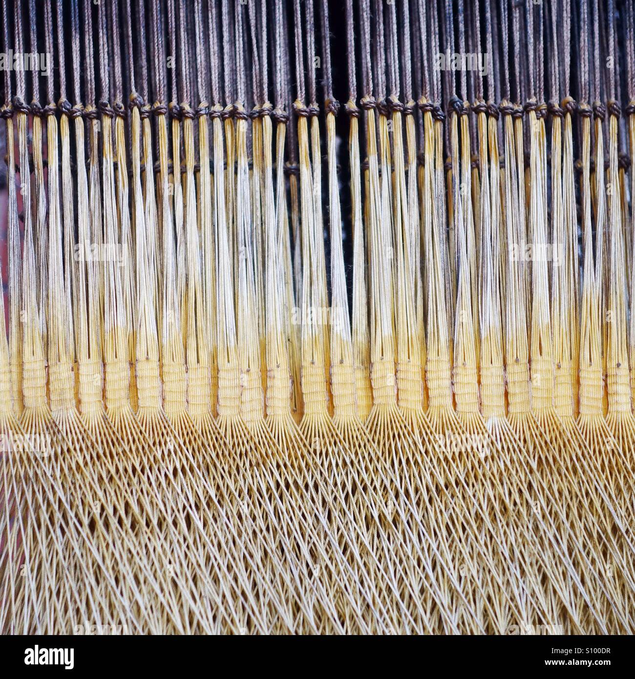 Close up of old weaving loom with waft and weft Stock Photo - Alamy