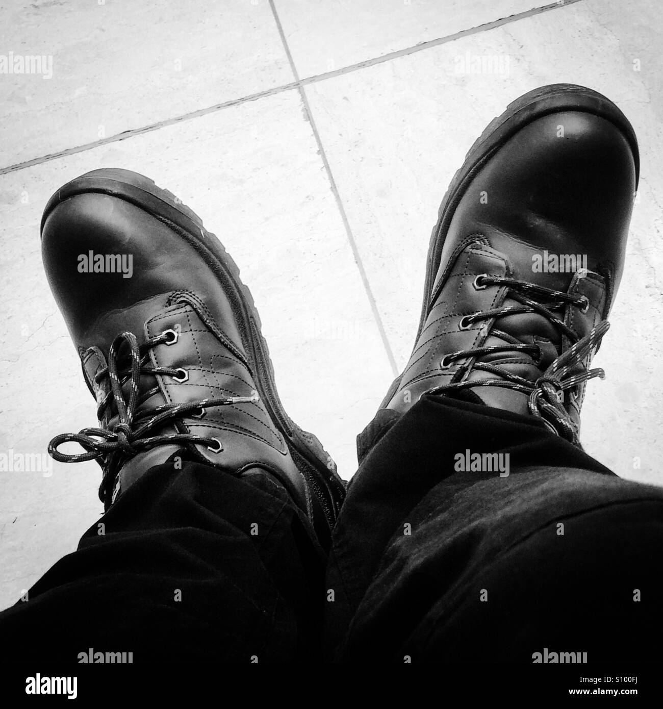 Wearing heavy boots hi-res stock photography and images - Alamy