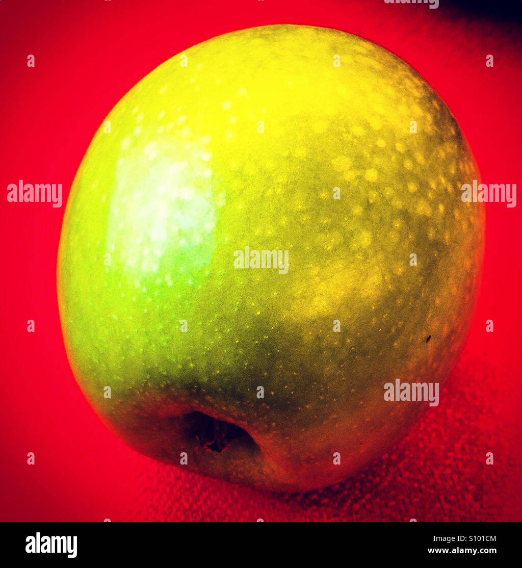 Green apple from unusual angle Stock Photo - Alamy