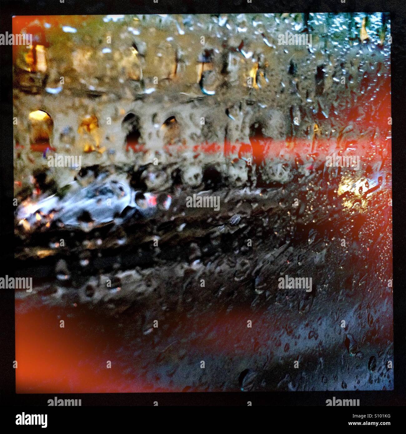 Red street lights in rain hi-res stock photography and images - Alamy
