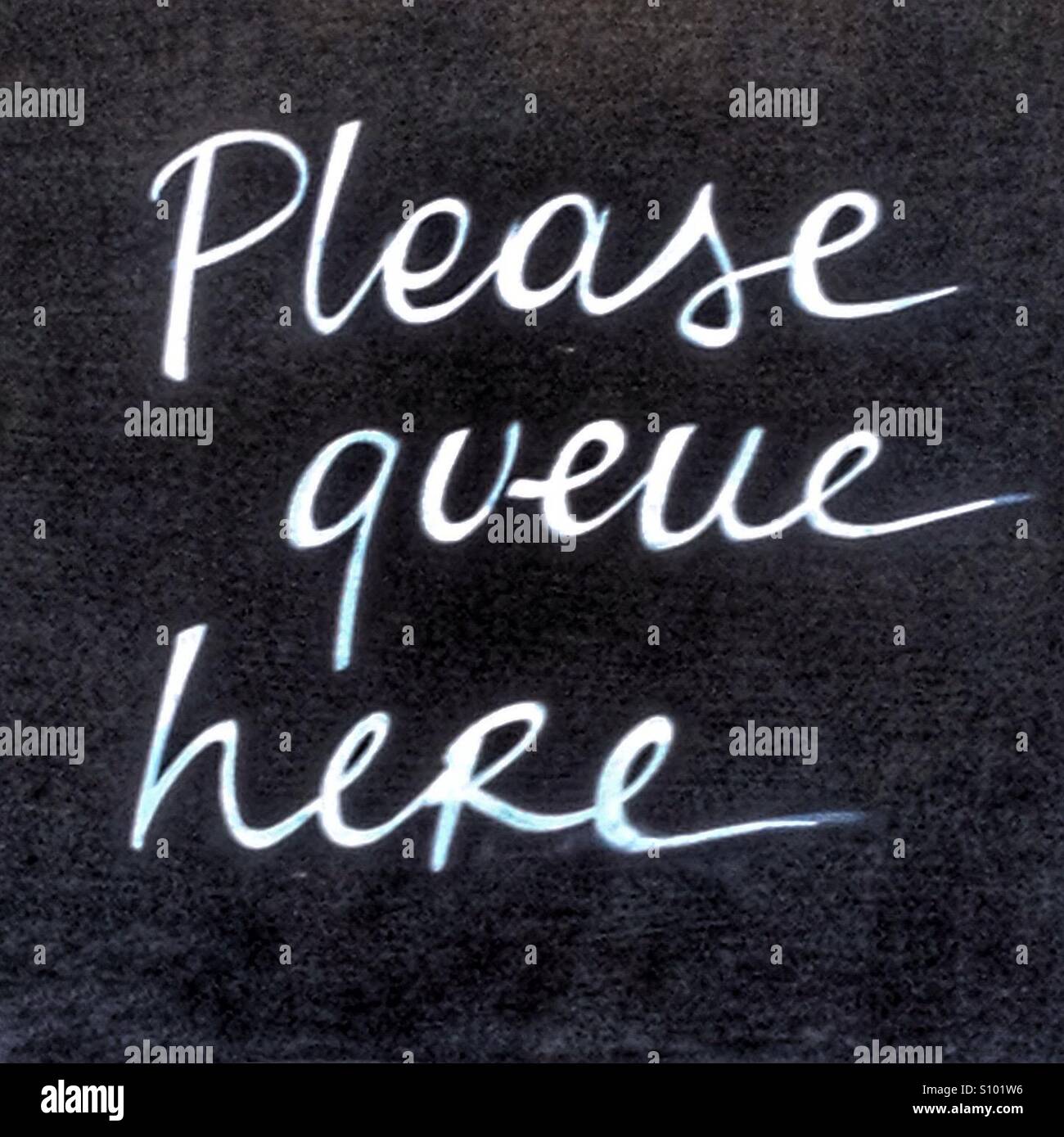 Please queue here hi-res stock photography and images - Alamy