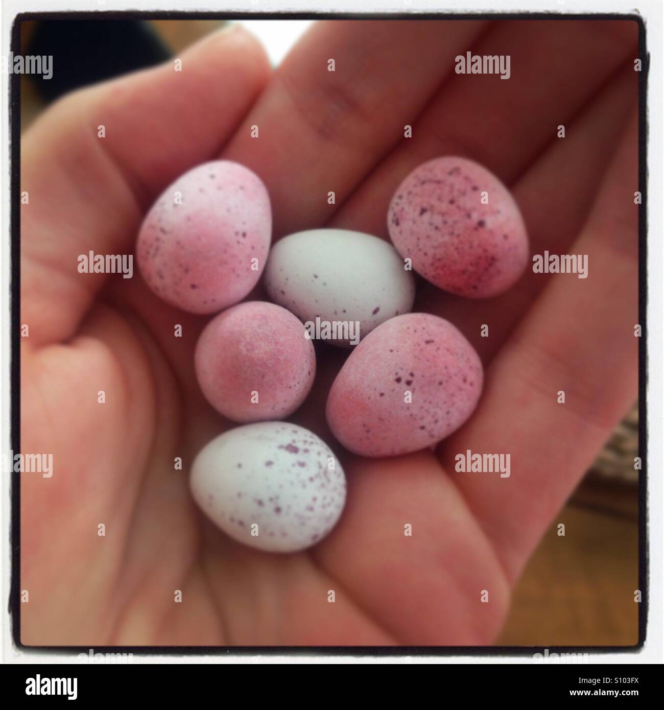 Handful of mini eggs Stock Photo - Alamy