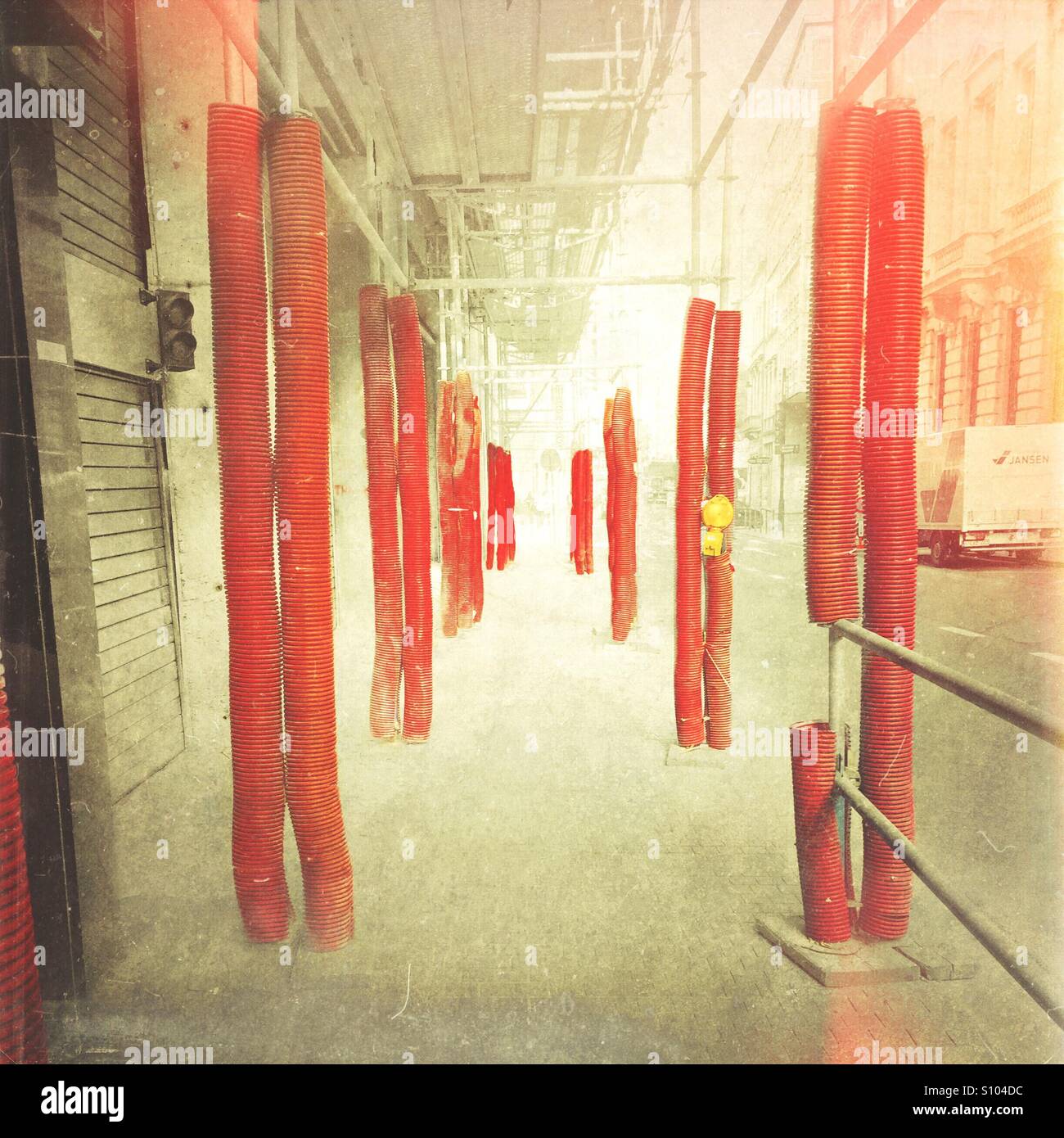 Red protection around scaffolding Stock Photo - Alamy