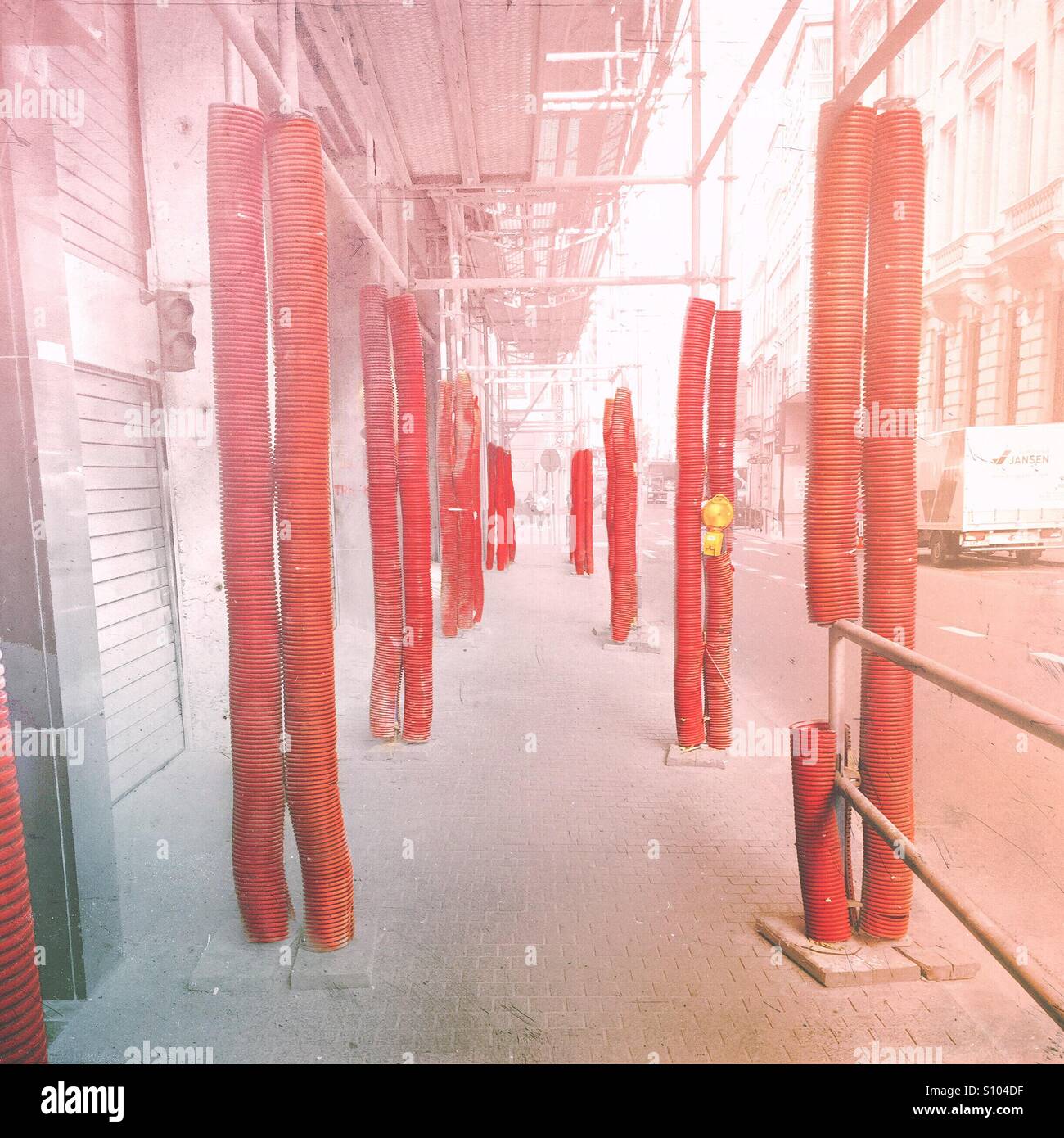 Red protection around scaffolding Stock Photo - Alamy