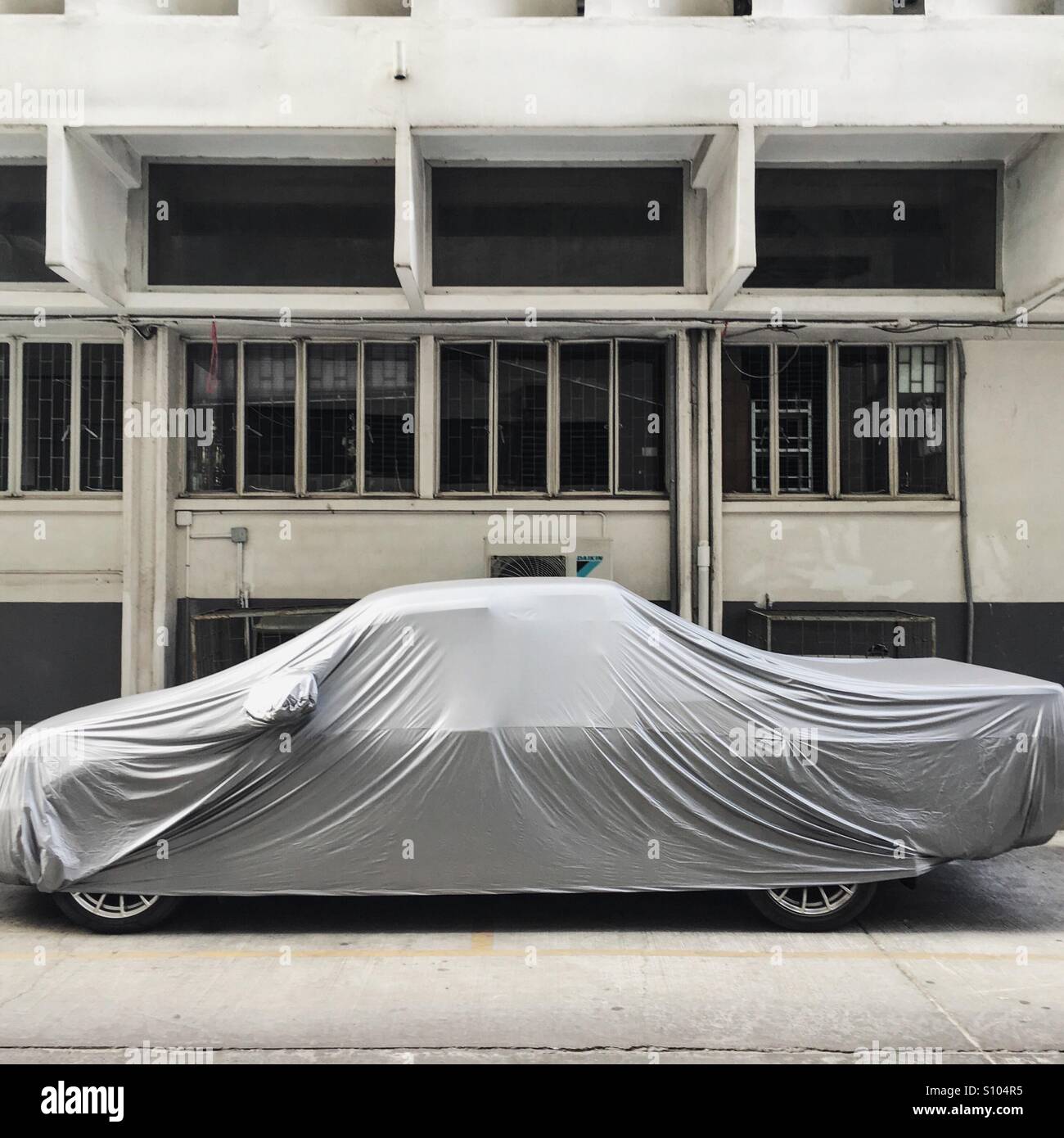 Car in a cover Stock Photo - Alamy