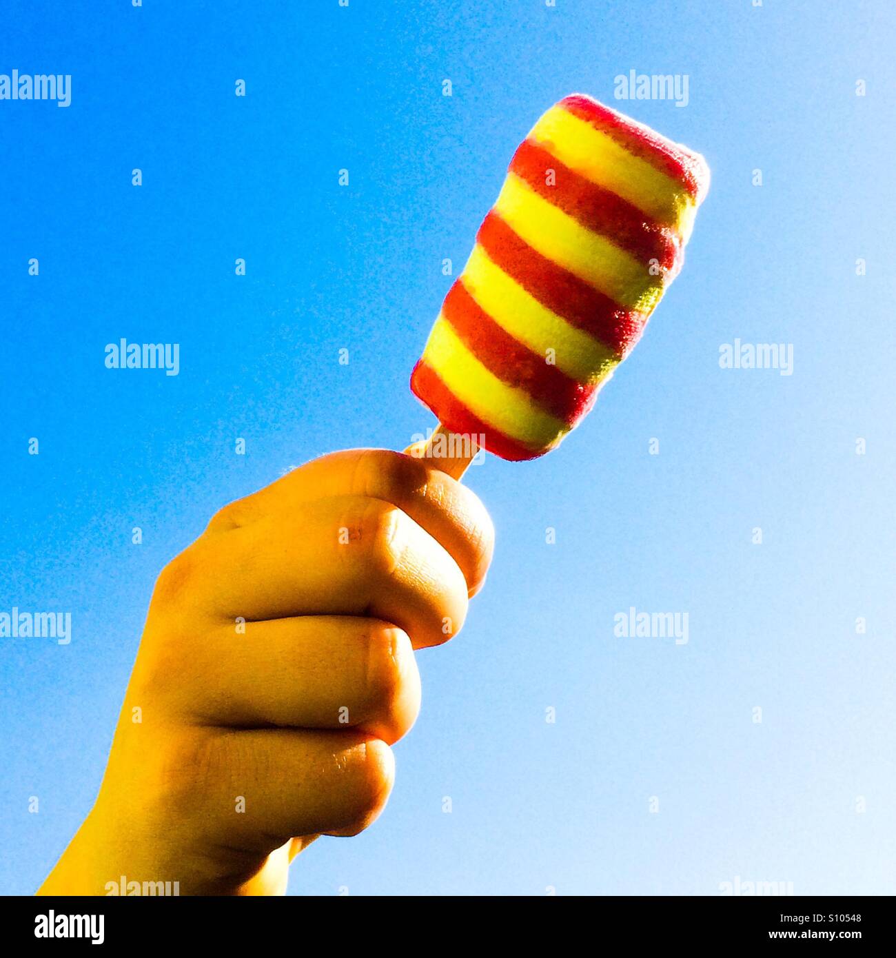 Red and yellow lolly hi-res stock photography and images - Alamy