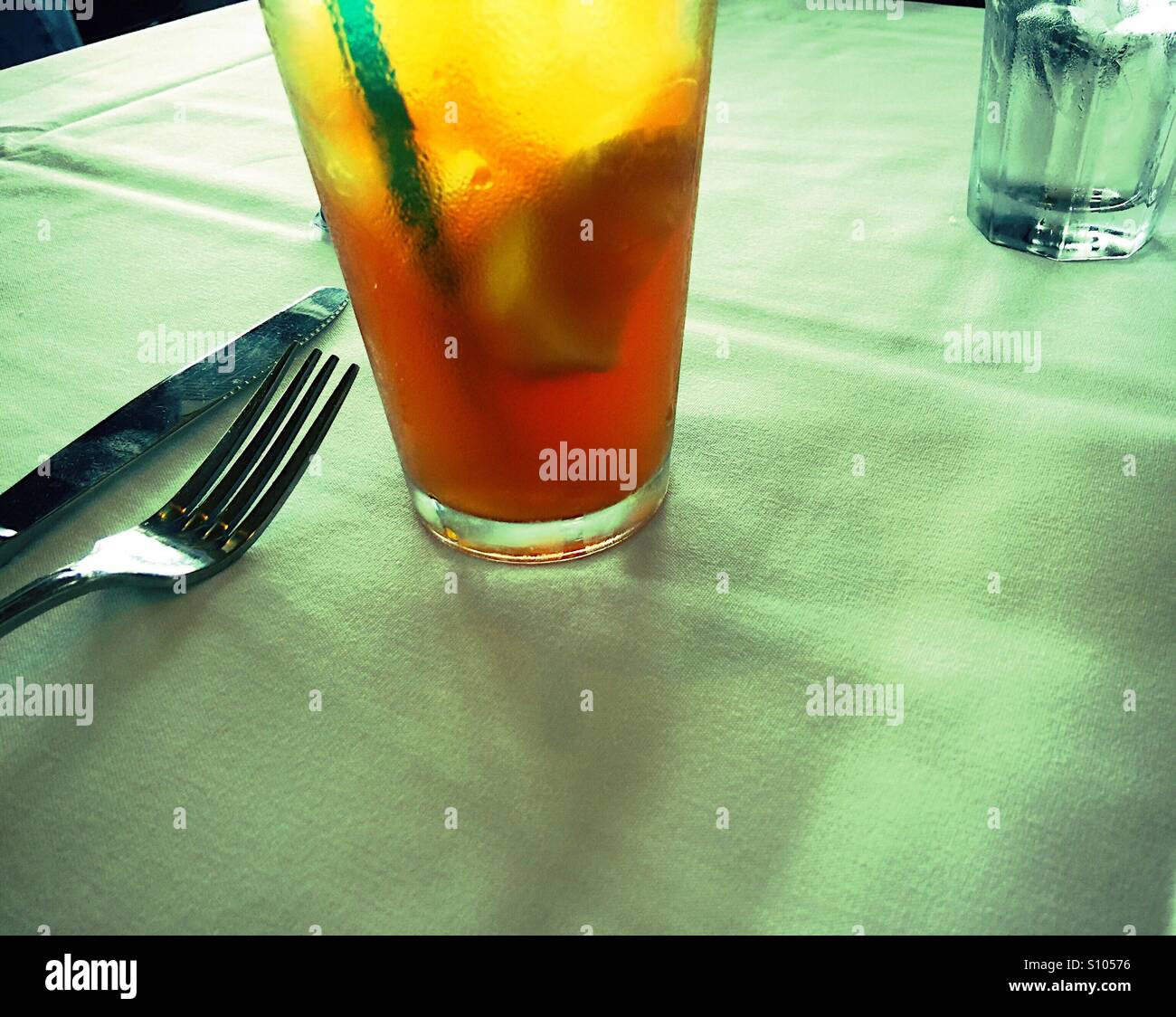 Restaurant table with iced tea Stock Photo - Alamy