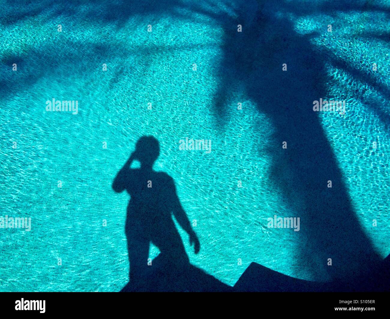 Persons shadow over water hi-res stock photography and images - Alamy