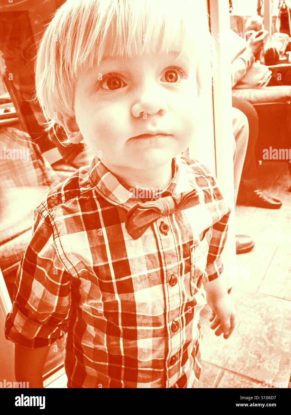 Boy with bow hi-res stock photography and images - Alamy