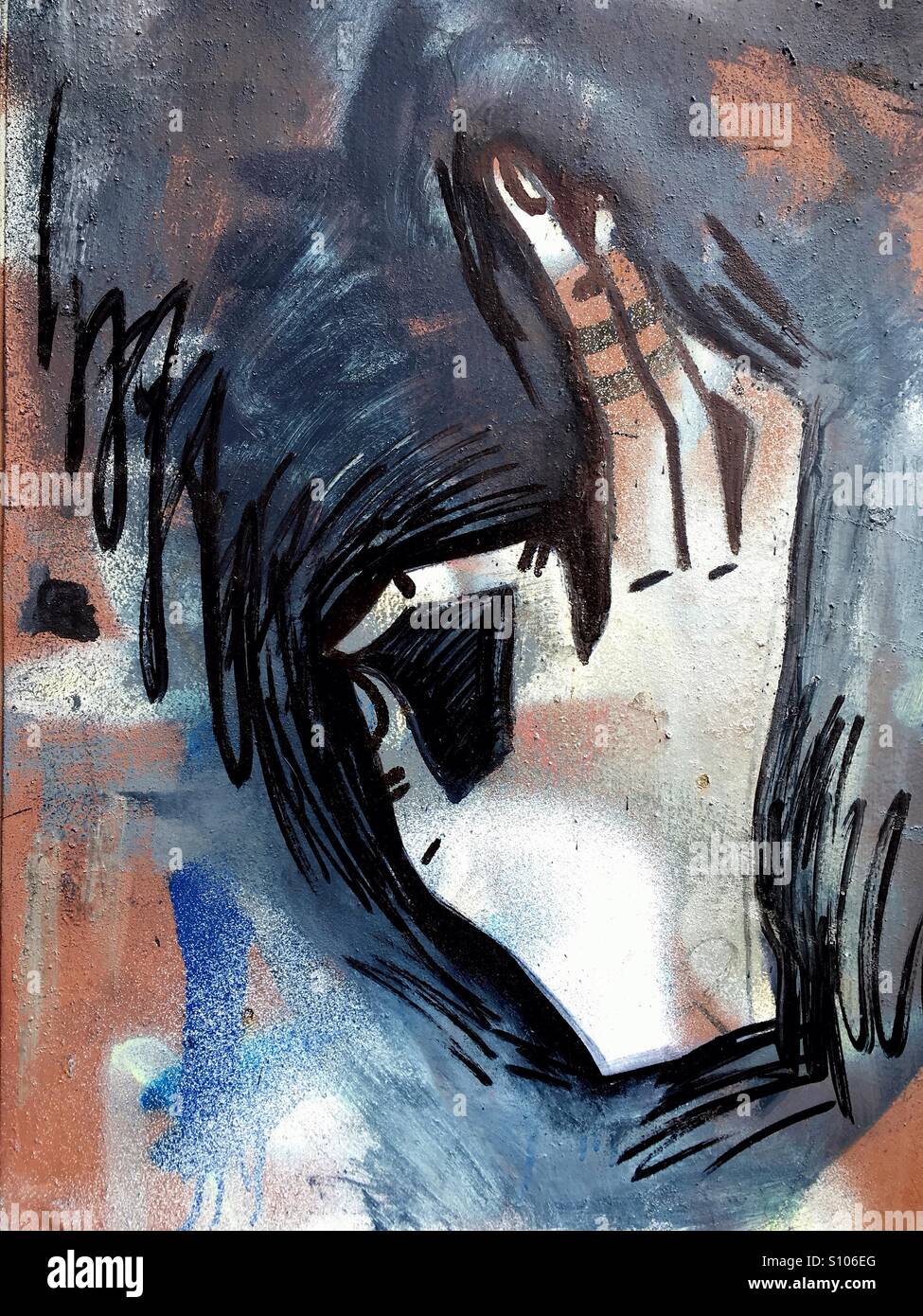 Colorful graffiti with hand image painted on wall Stock Photo - Alamy