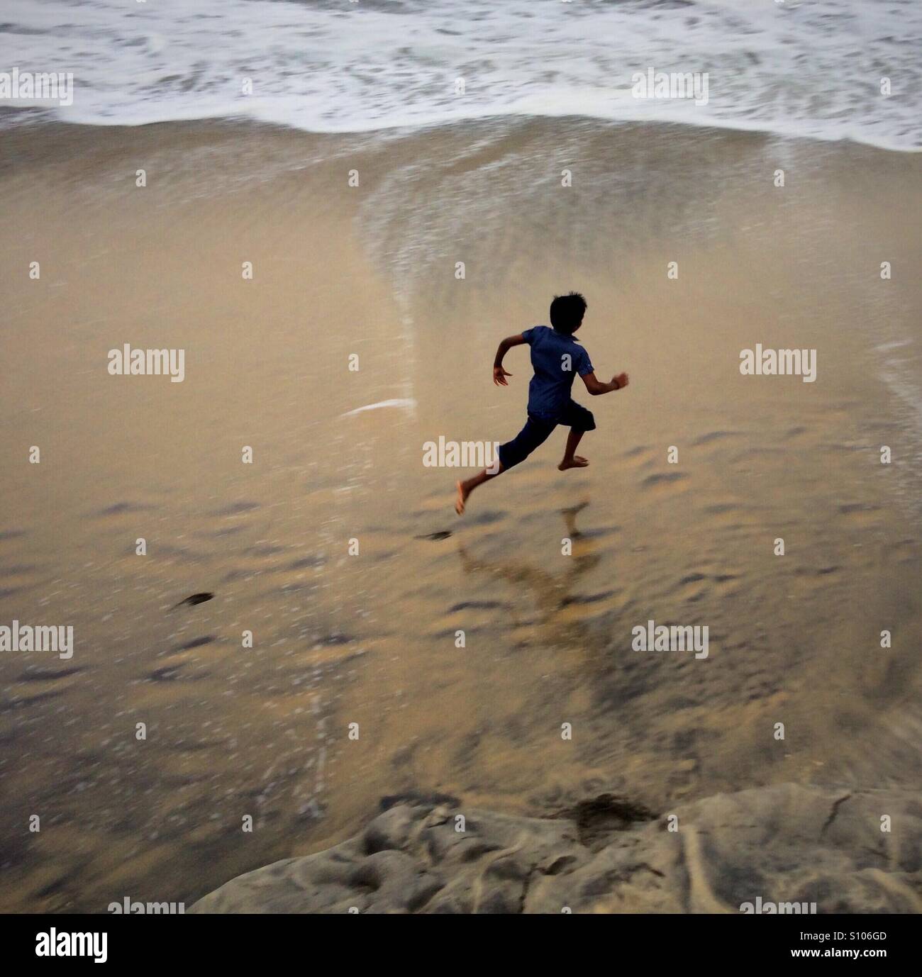 Indian boy running hi-res stock photography and images - Alamy