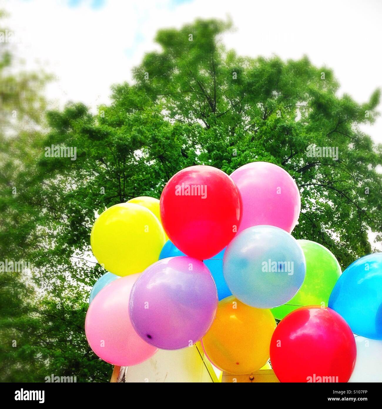 Bright coloured balloon hi-res stock photography and images - Alamy
