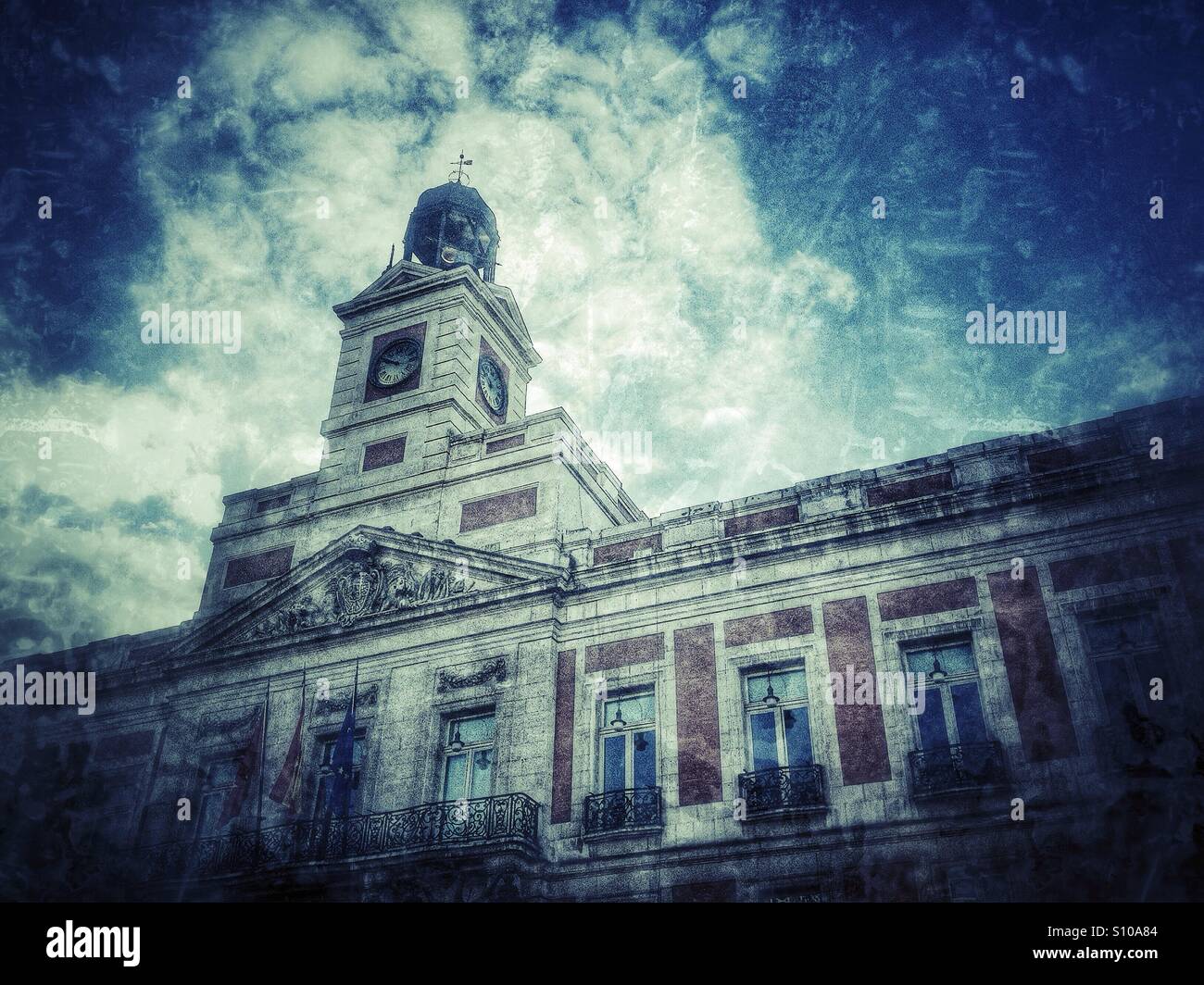 View of the building and clock of the famous Puerta del Sol in Madrid ...