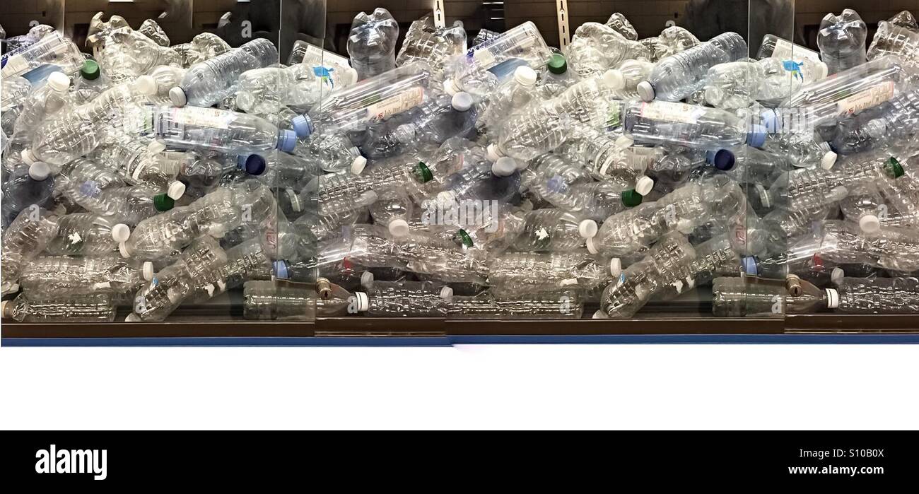 Empty plastic bottles in display case Stock Photo - Alamy