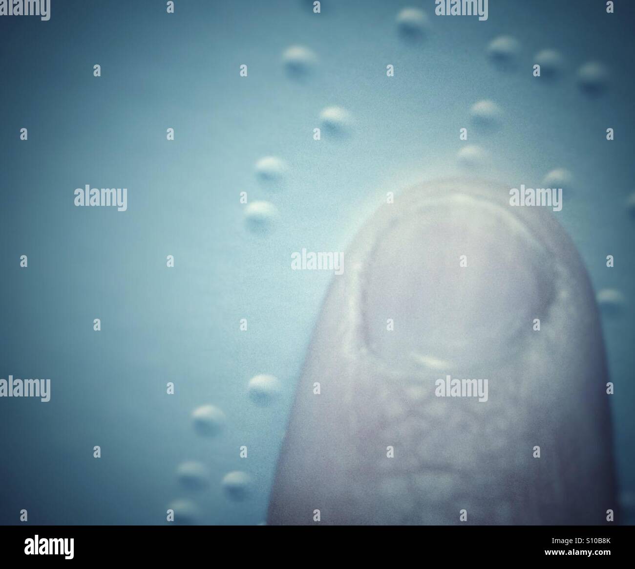 Finger reading braile writed on a medicine prescription packaging Stock ...