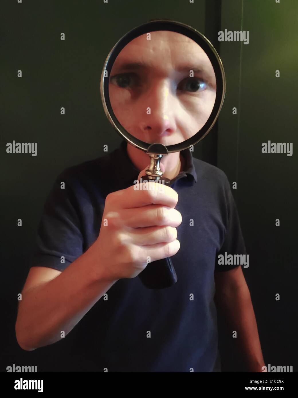 Man With A Magnifying Glass High Resolution Stock Photography and ...