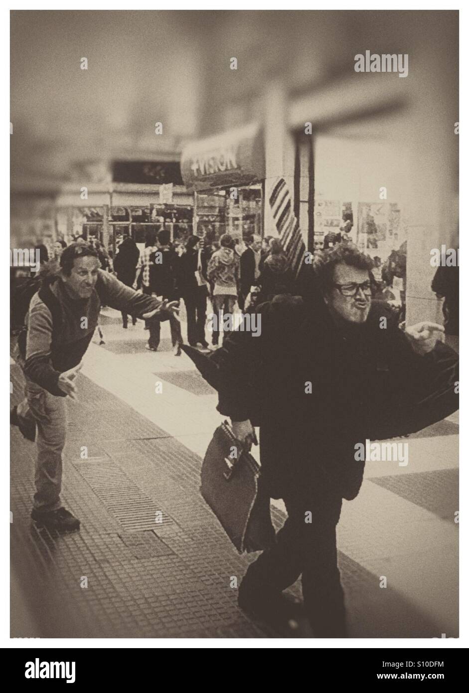 Man chasing comical man hi-res stock photography and images - Alamy