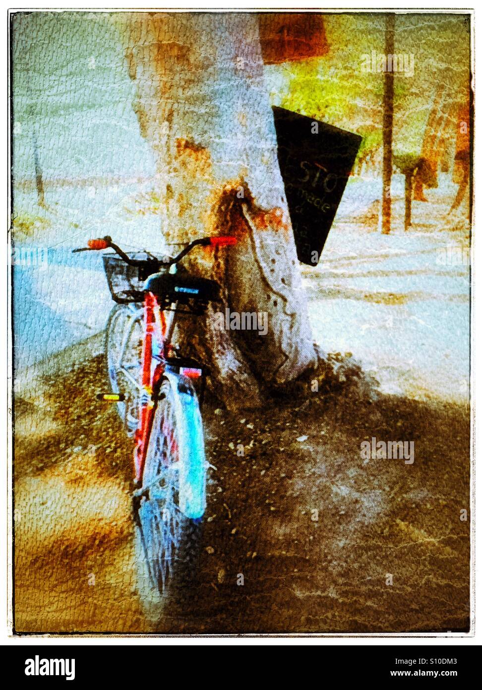 Bicycle leaning against tree hi-res stock photography and images - Alamy