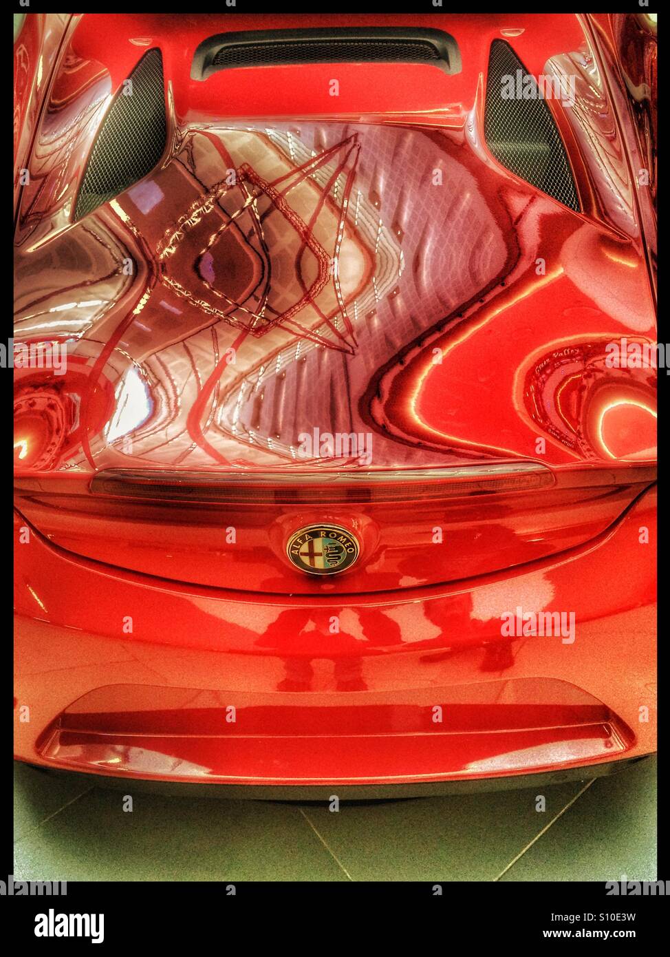 Light patterns on Alfa Romeo sports coupe Stock Photo - Alamy