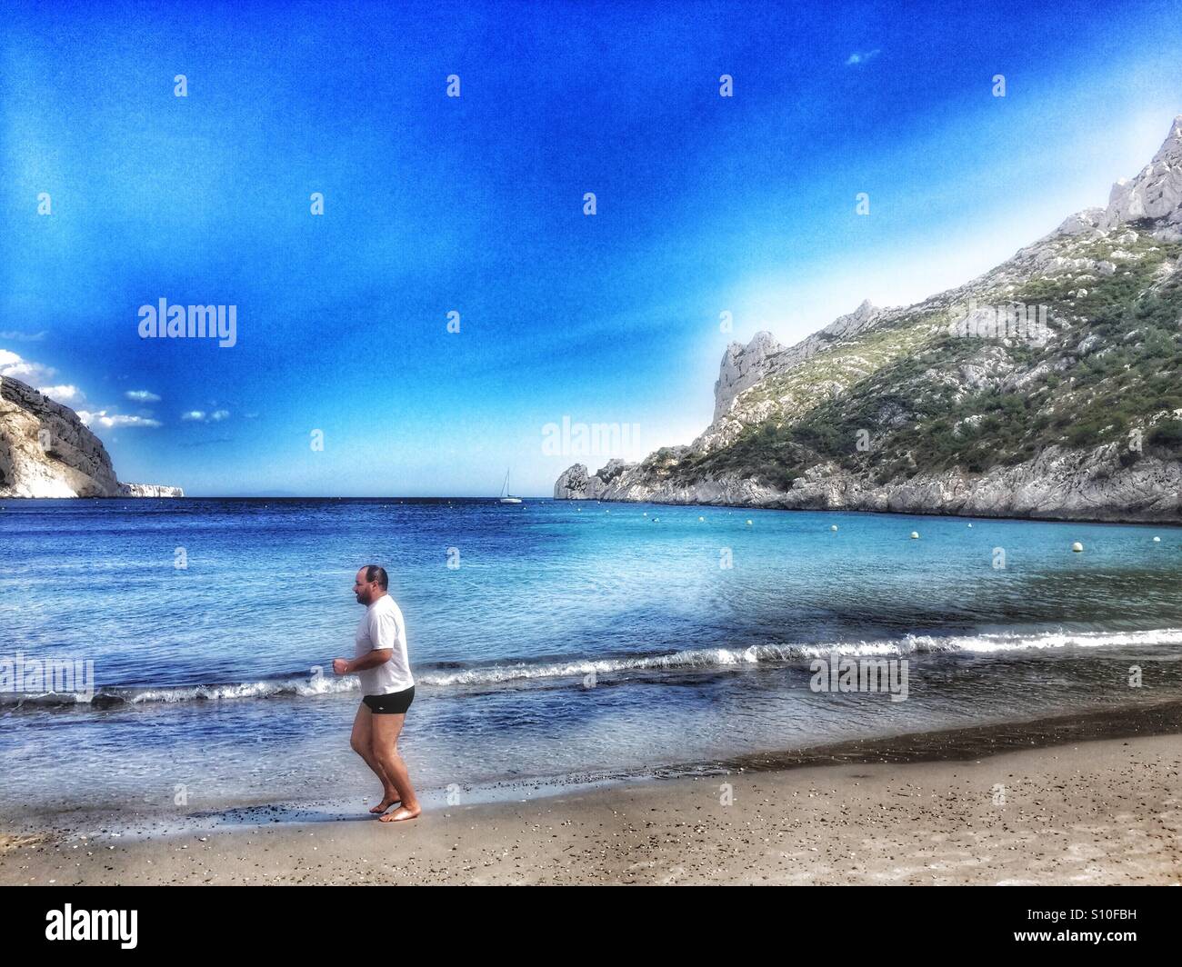 Fat man on beach hi-res stock photography and images - Alamy