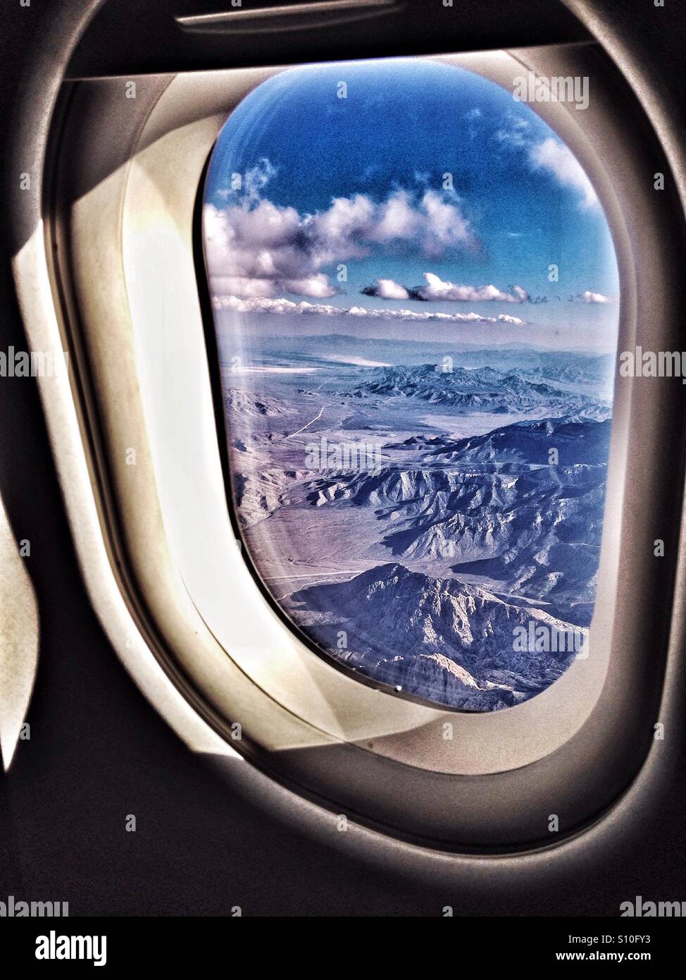 Airplane window and mountain view of Nevada, USA Stock Photo - Alamy