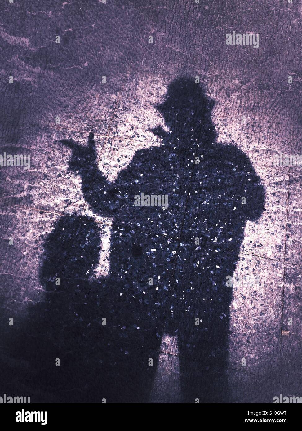 Gangster shadow on ground Stock Photo - Alamy