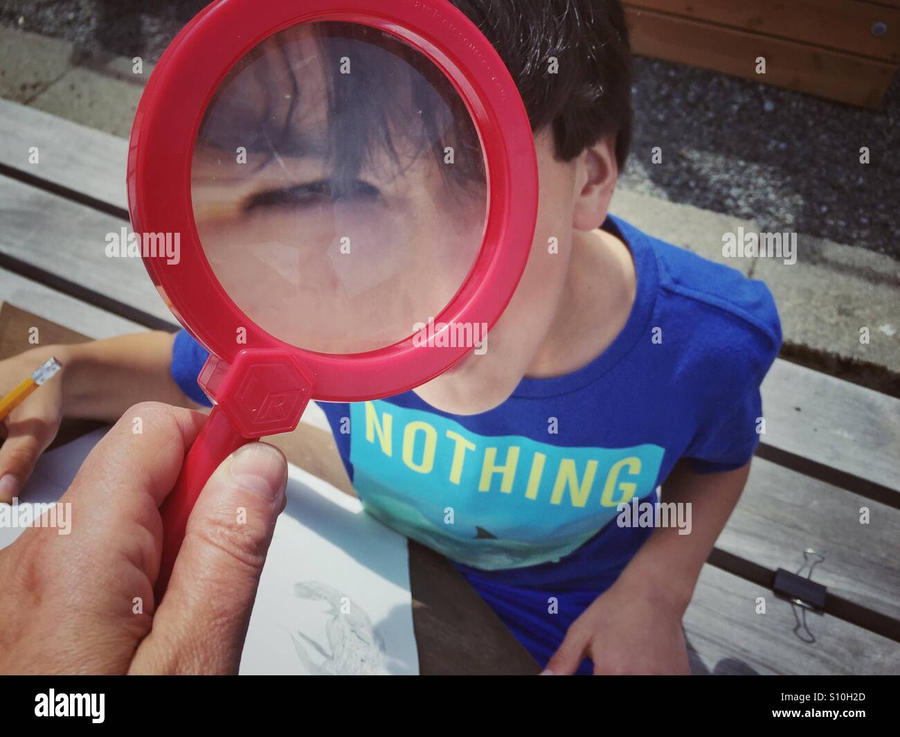 Magnifying glass eye hi-res stock photography and images - Alamy