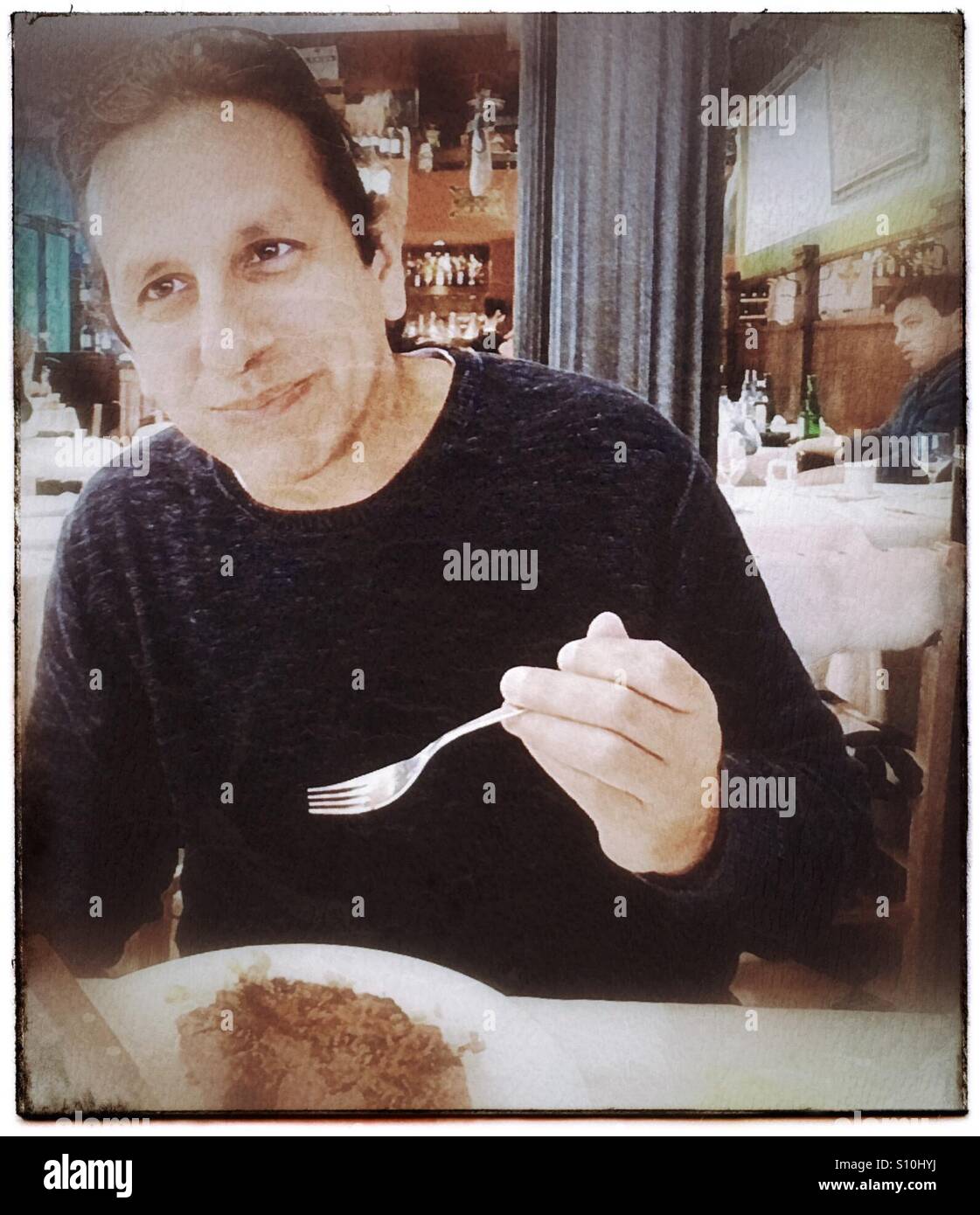 Man enjoying a steak Stock Photo - Alamy