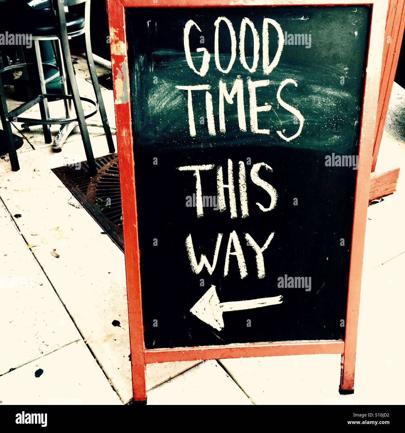 Good times this way bar sign Stock Photo - Alamy