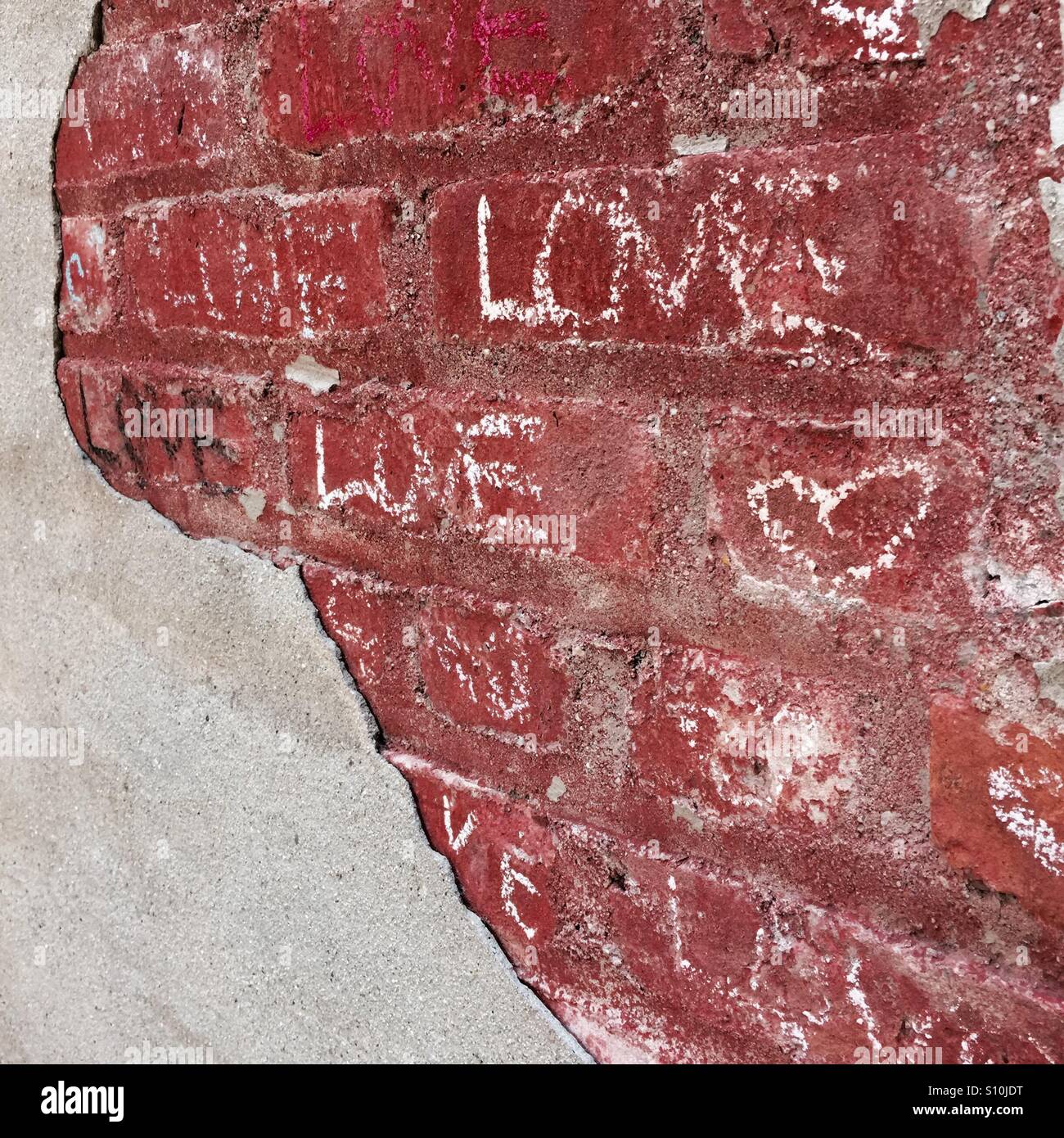 Chalk Love Graffiti on Brick Stock Photo - Alamy