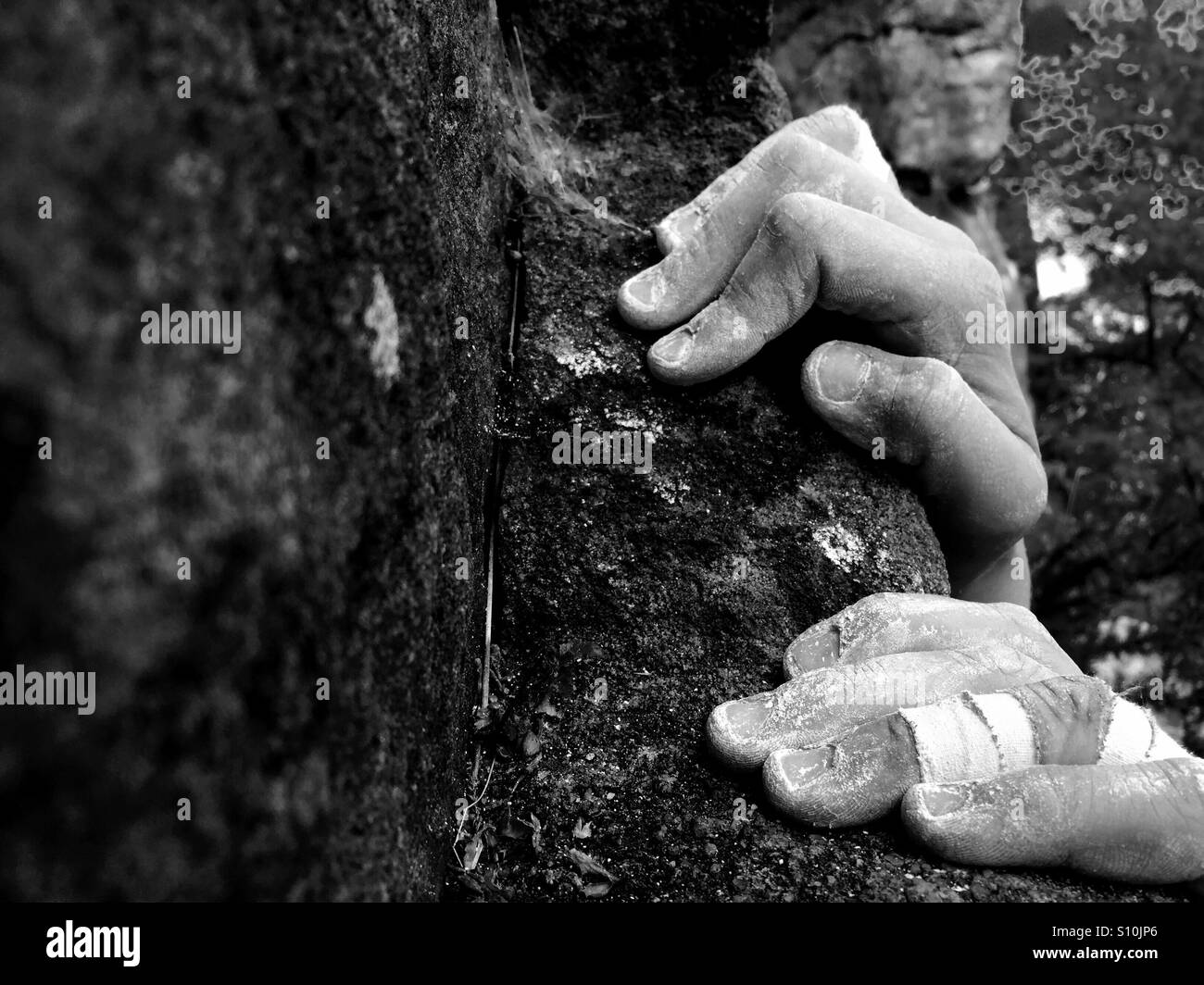 Rock climbing hands Black and White Stock Photos & Images - Alamy