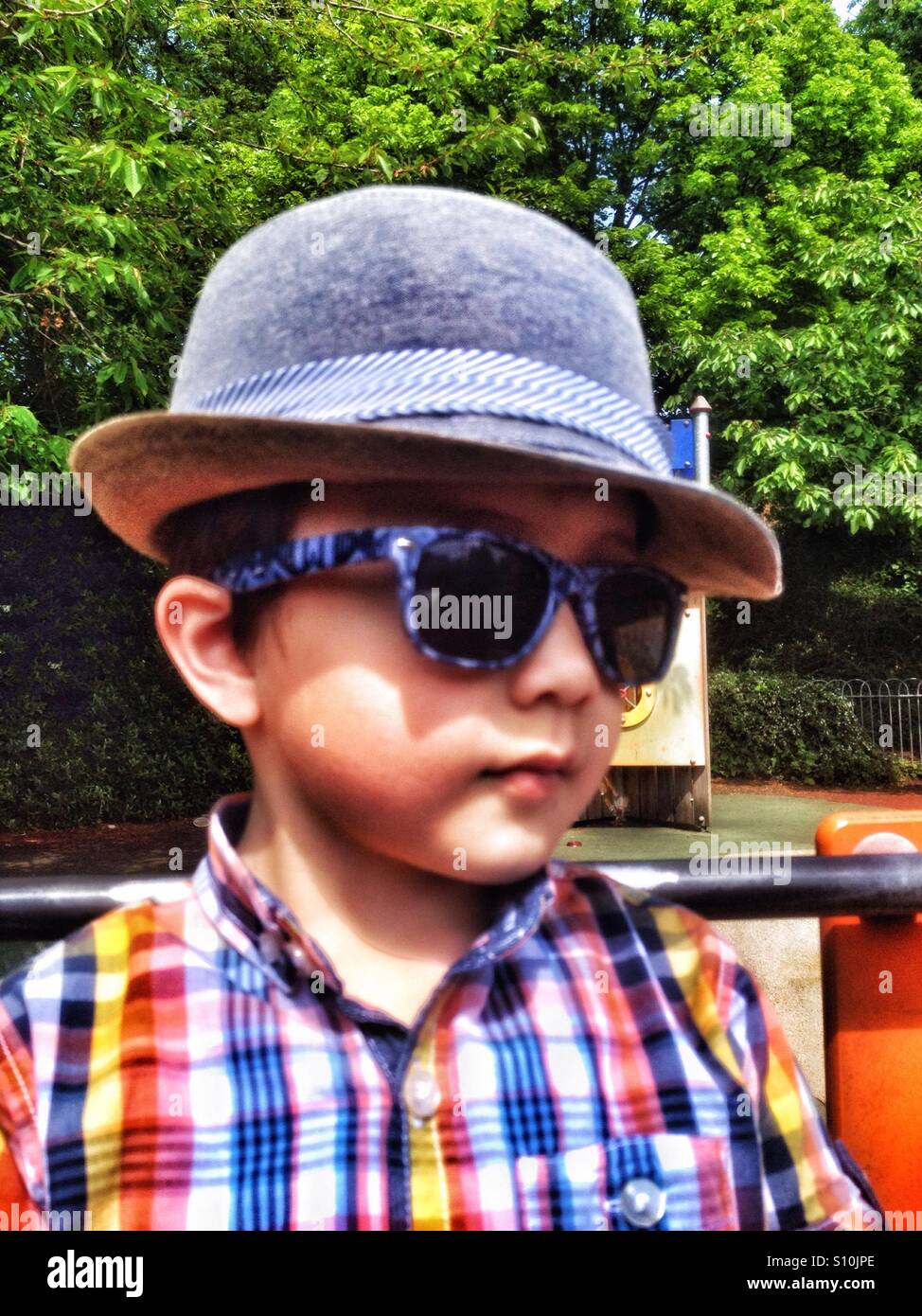 Boy in cheque shirt hi-res stock photography and images - Alamy