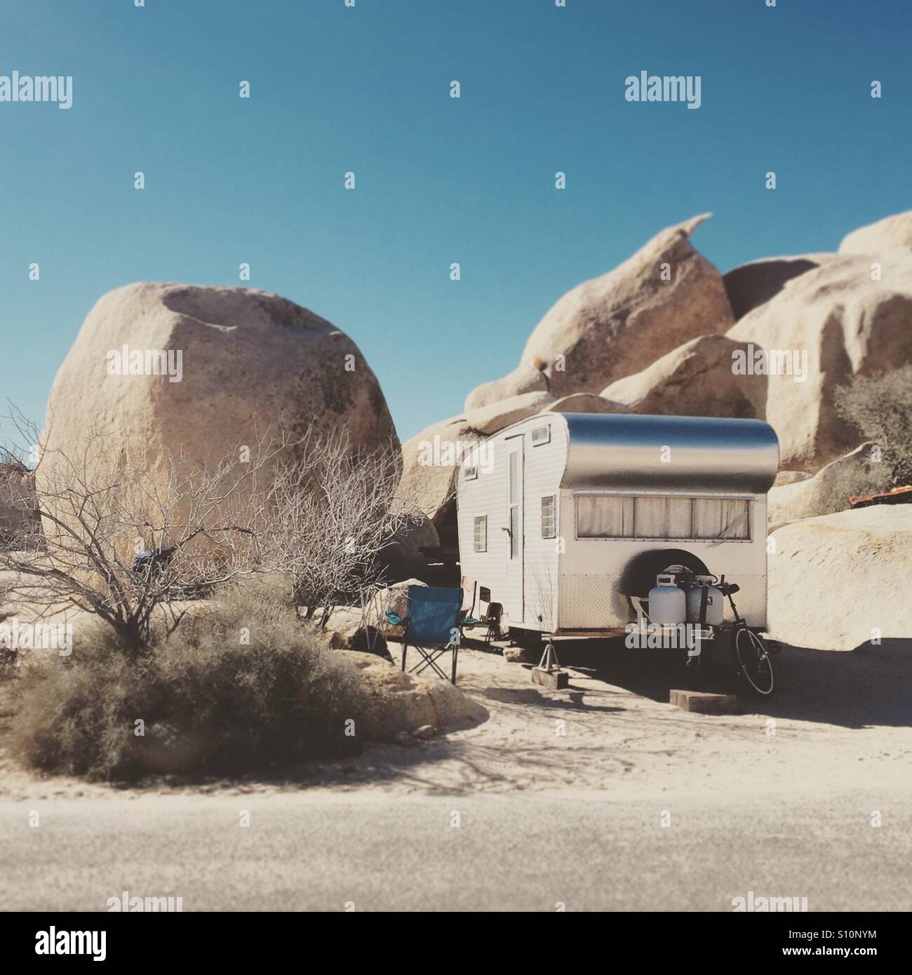 Camper at Hidden Valley campground, Joshua Tree National Park ...