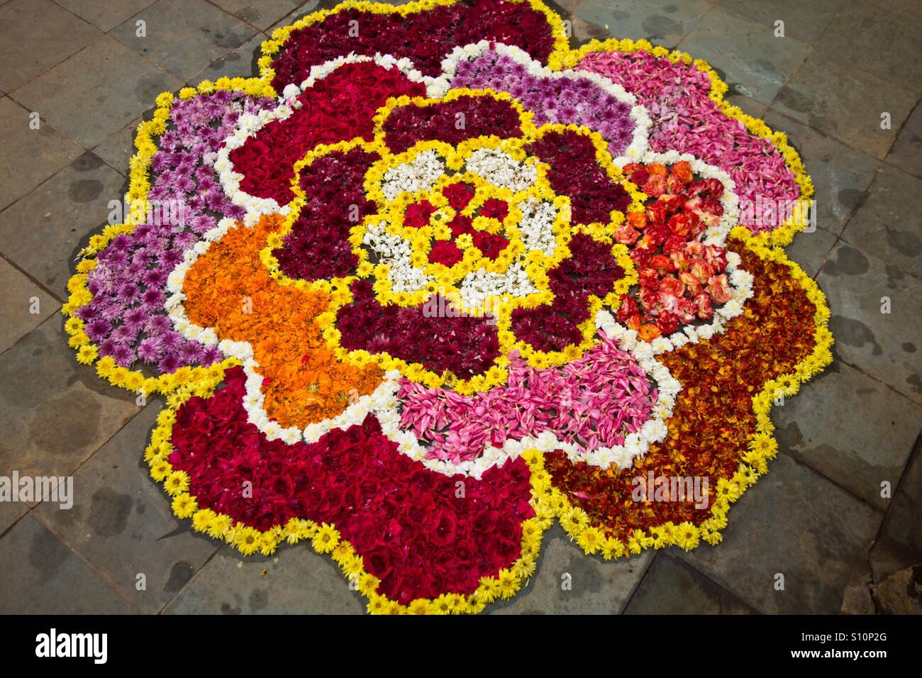 Rangoli made of natural flowers, India Stock Photo - Alamy