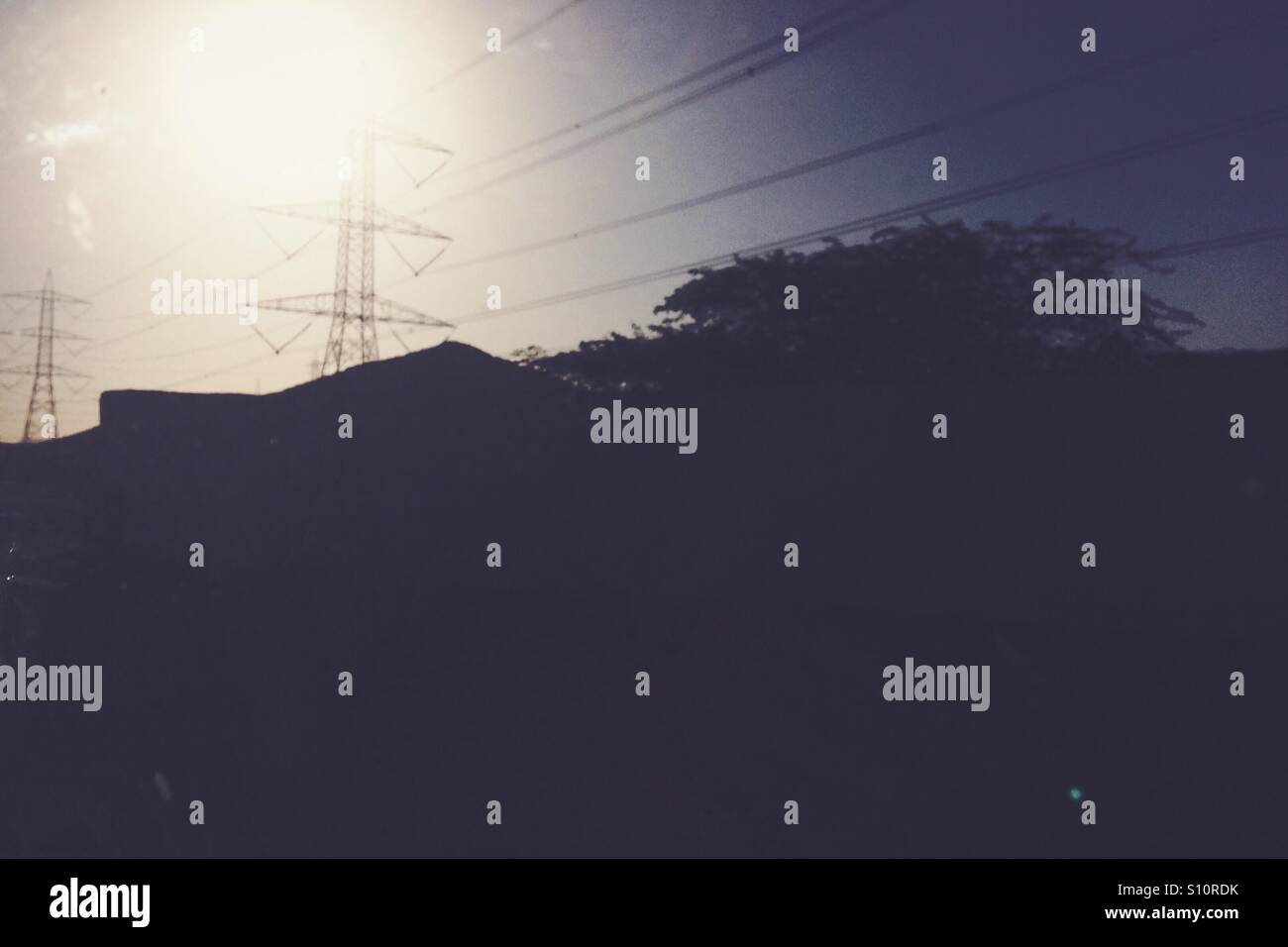 Sunset shadow with electrical cables Stock Photo - Alamy