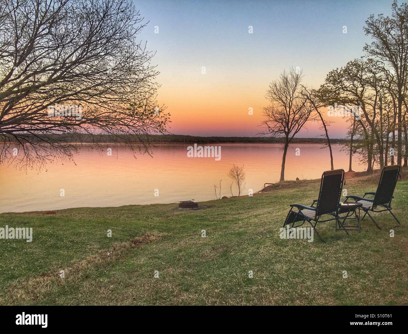 Sunset at campground on lake in Oklahoma Stock Photo - Alamy