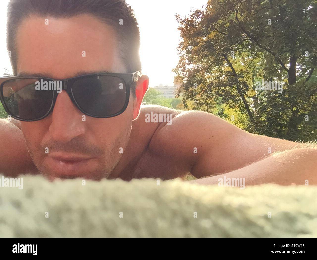 Sun tanning hi-res stock photography and images - Alamy