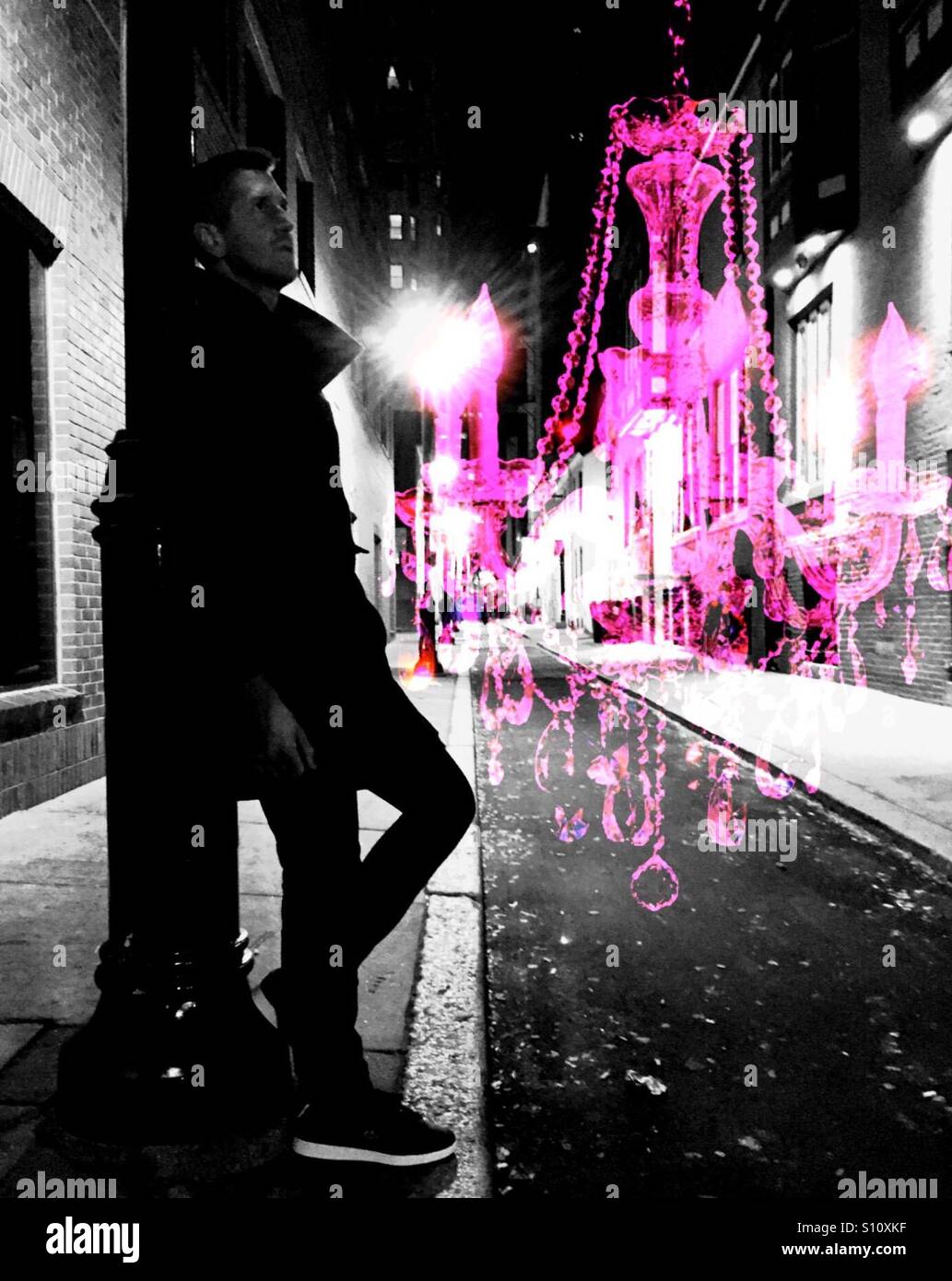 Male leaning against lamppost hi-res stock photography and images - Alamy