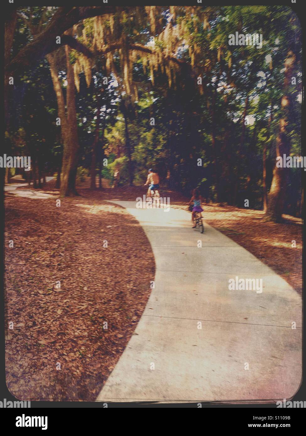 Two people with bike hi-res stock photography and images - Alamy