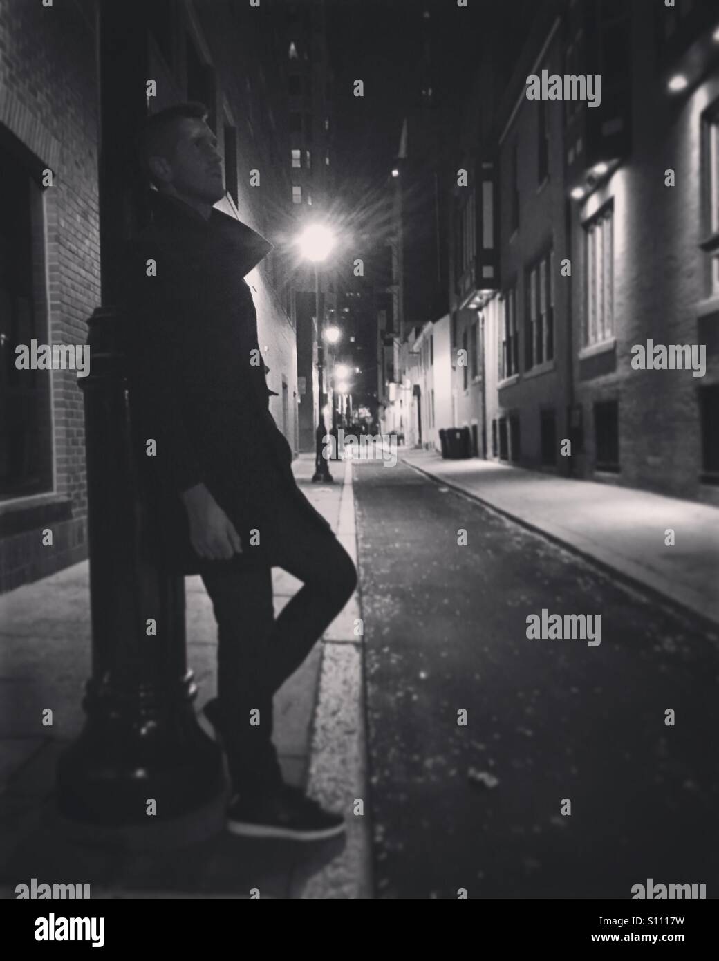 Leaning alley hi-res stock photography and images - Alamy