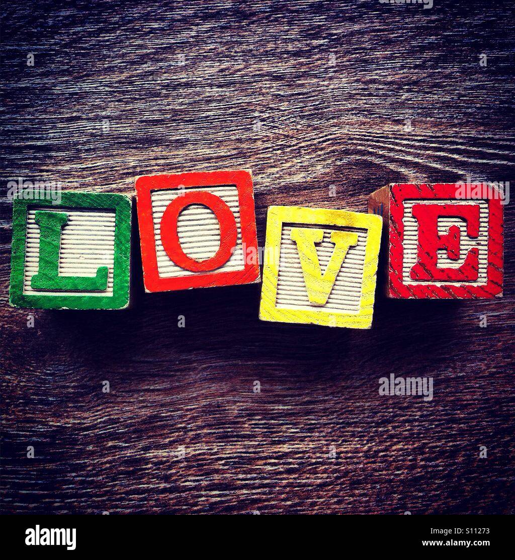 Word LOVE done with alphabet wood blocks letters Stock Photo - Alamy