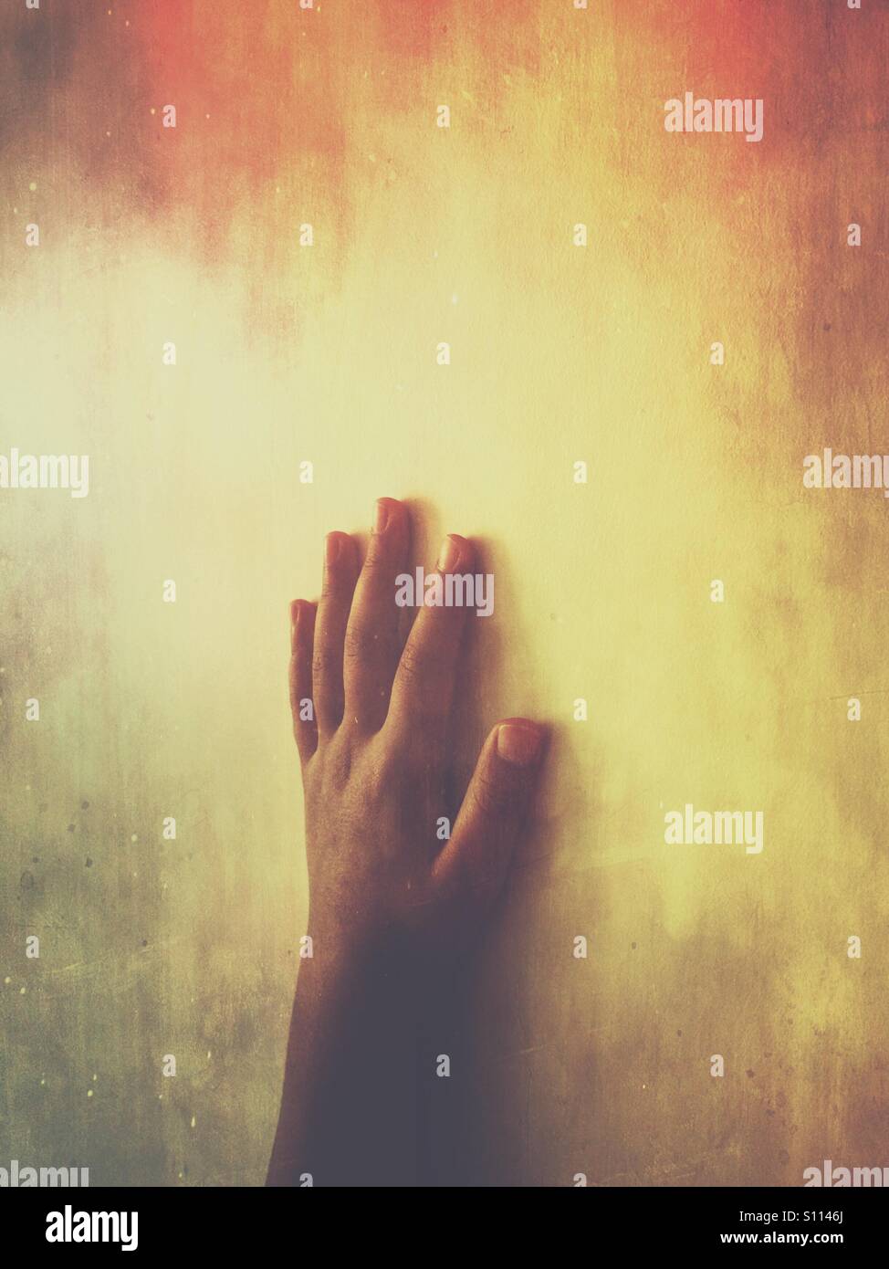 Boy's hand on the wall Stock Photo - Alamy