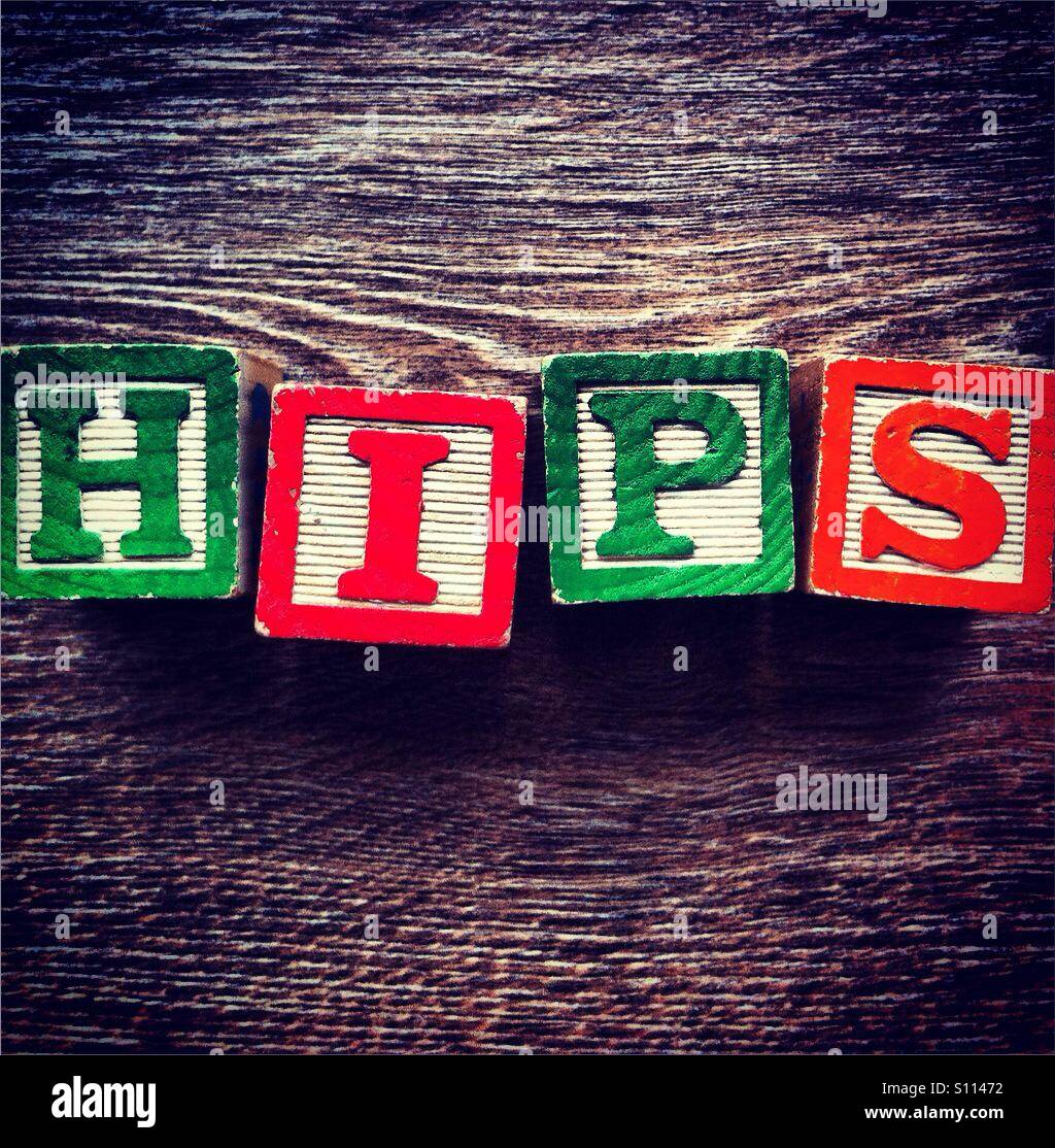 Word HIPS done with wood blocks letters Stock Photo - Alamy
