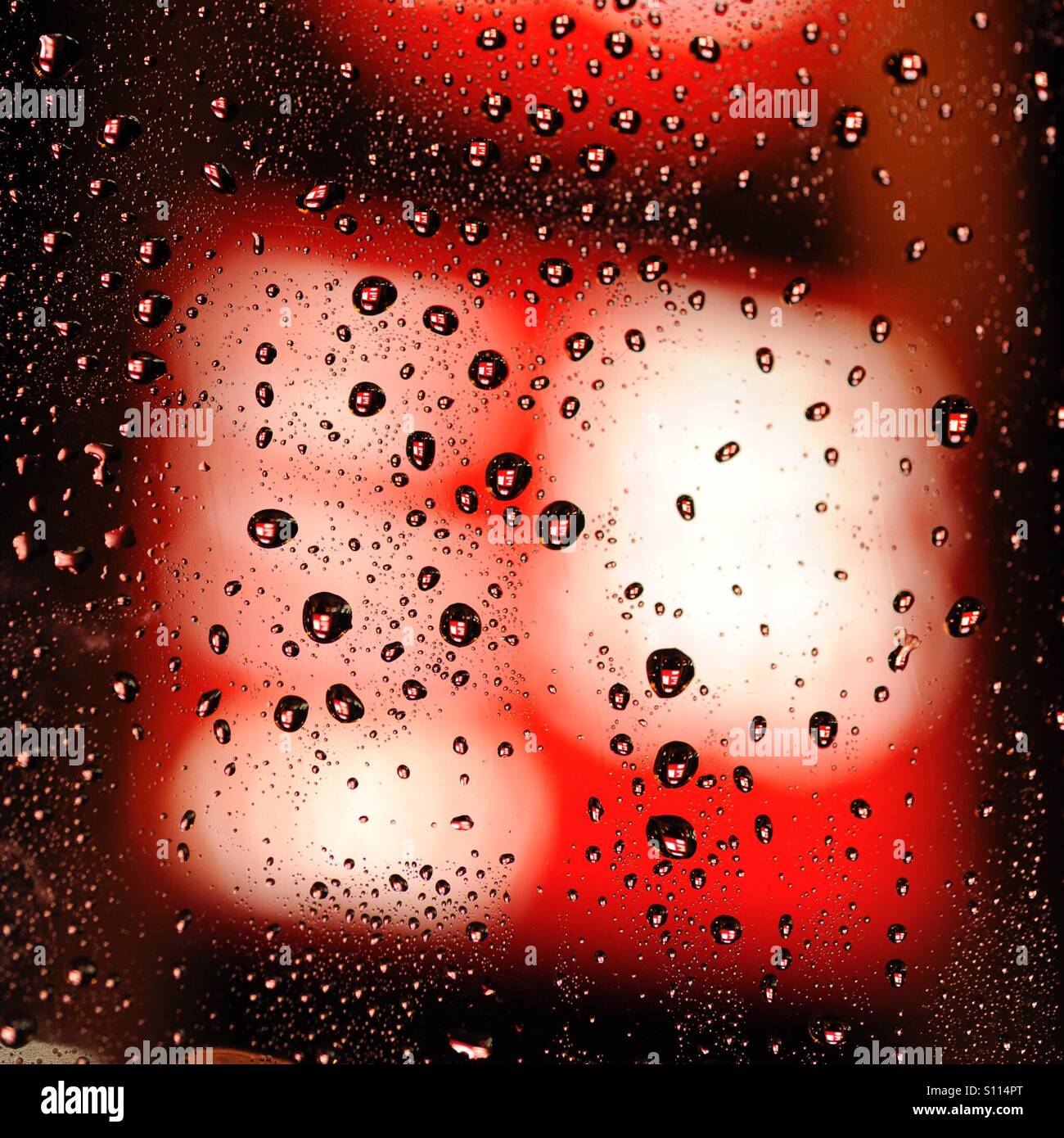City through rainy window at night hi-res stock photography and images ...