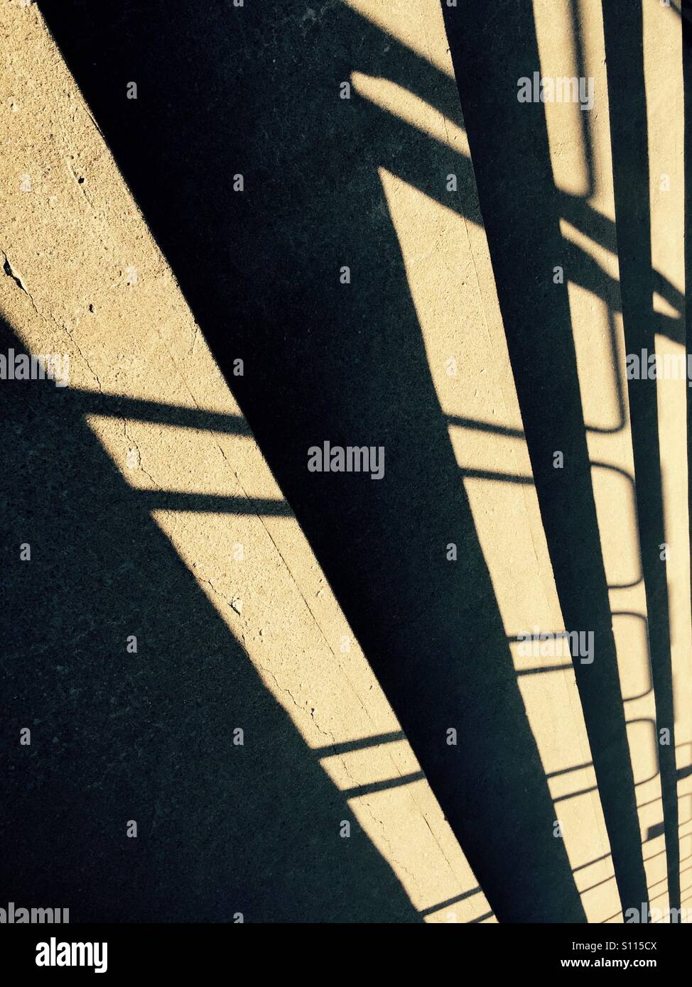 Shadows in line pattern Stock Photo - Alamy