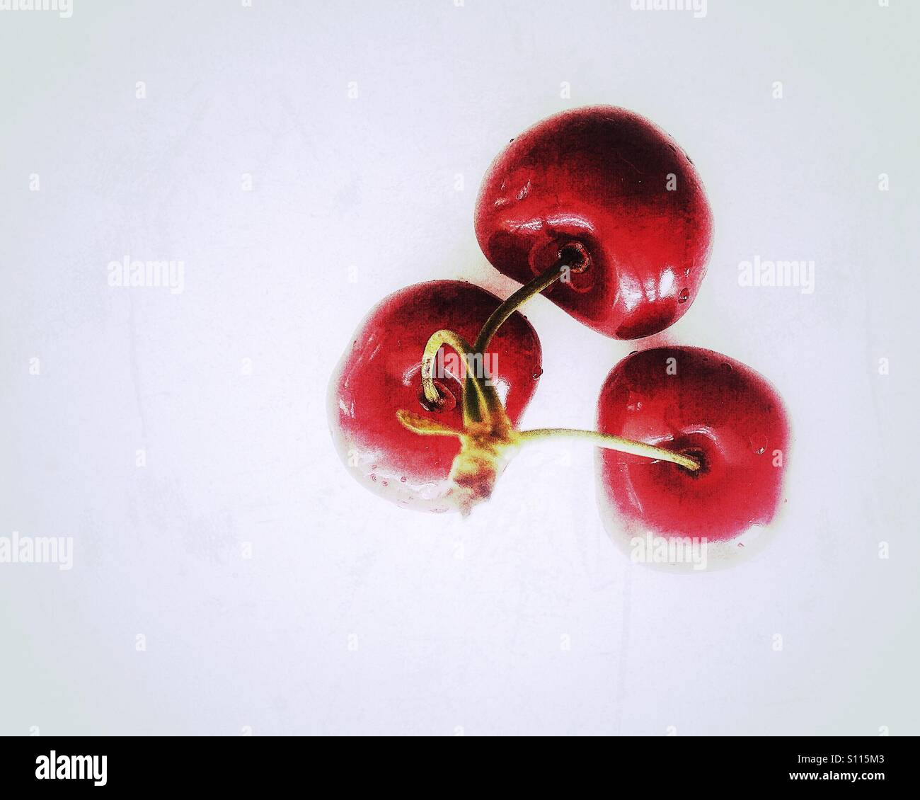 Three cherries connected. Photographed from above, room for copy Stock ...